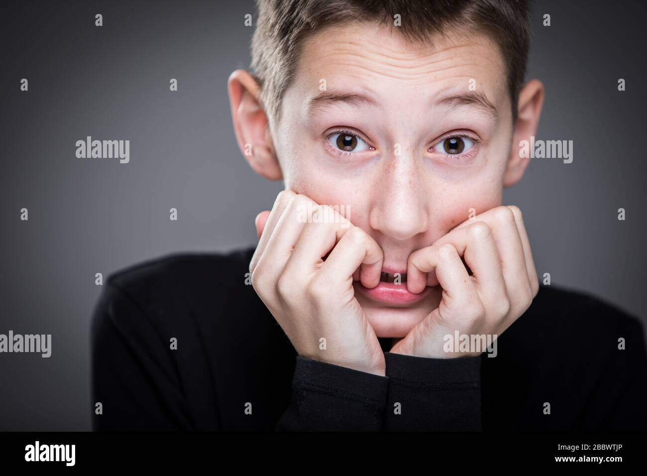 Grief-stricken little boy - feeling intense sorrow, remorse, sadnesss ...