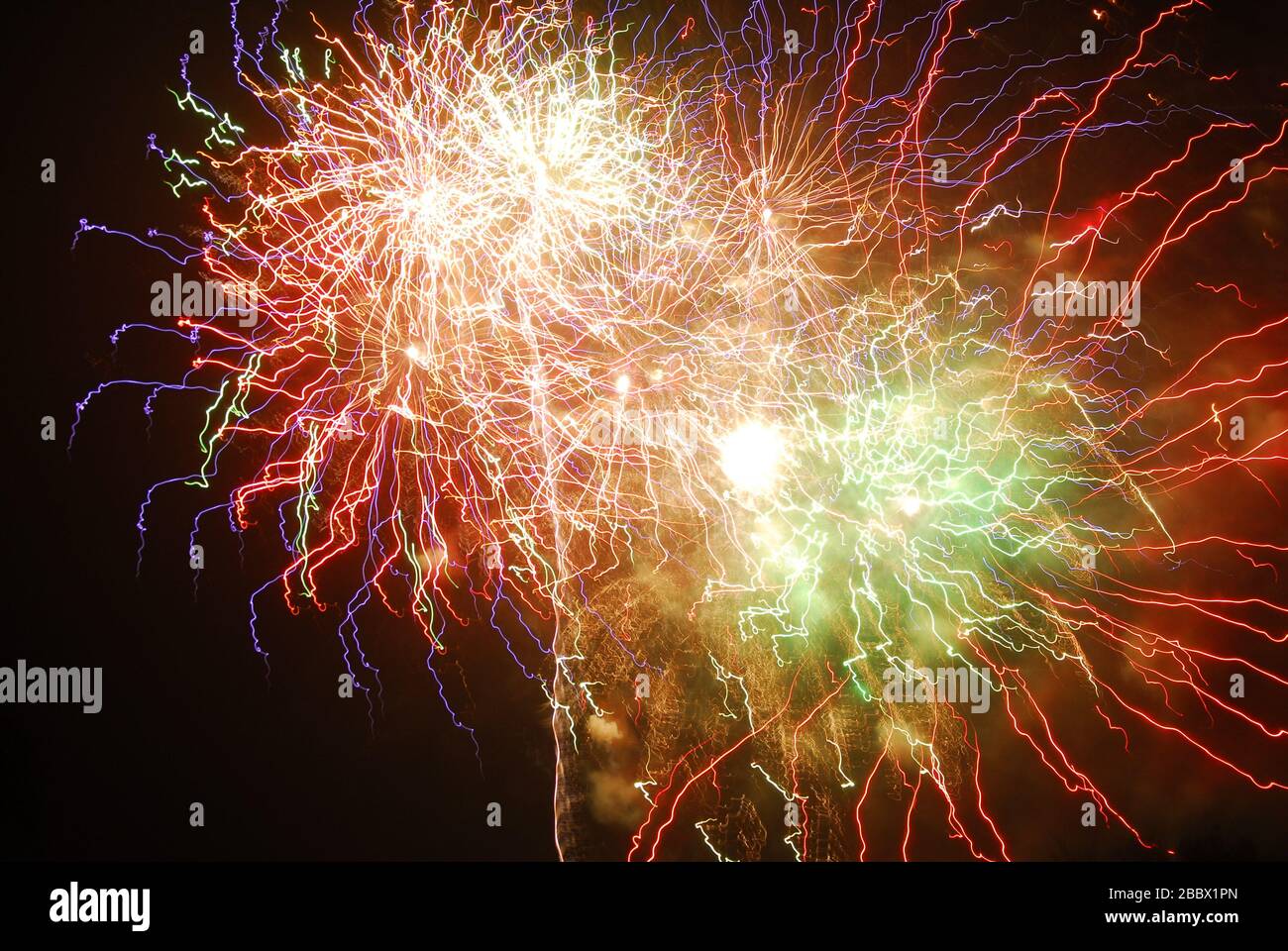 Firework light trails on July 4th Stock Photo - Alamy