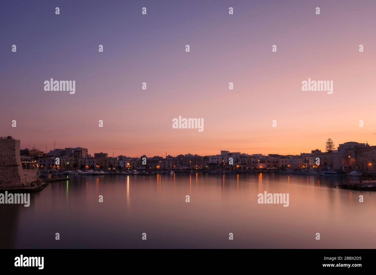 Sunset over the port of Trani, Italy Stock Photo - Alamy