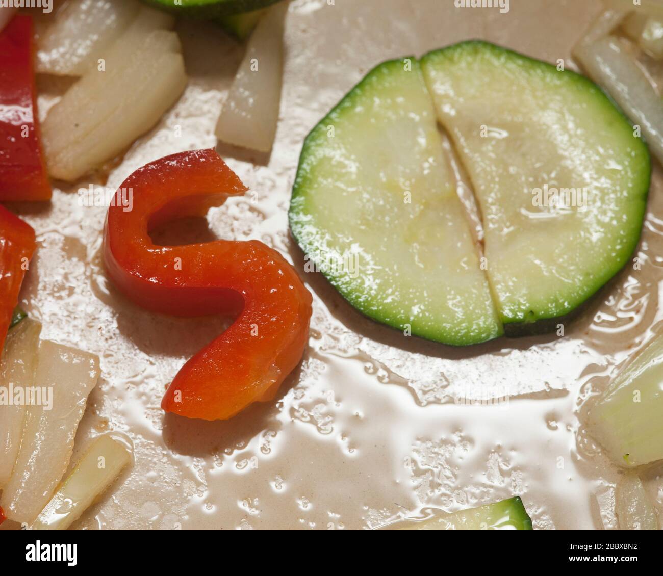 So ? Red bell sweet pepper shaped like a letter S and courgette O in ...