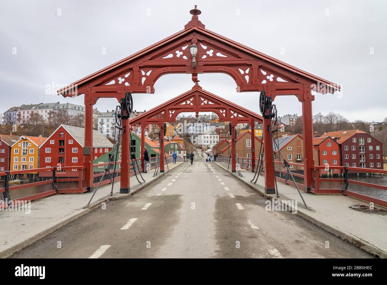 Walking through the old red gates on the Gamle Bybro Bridge in ...