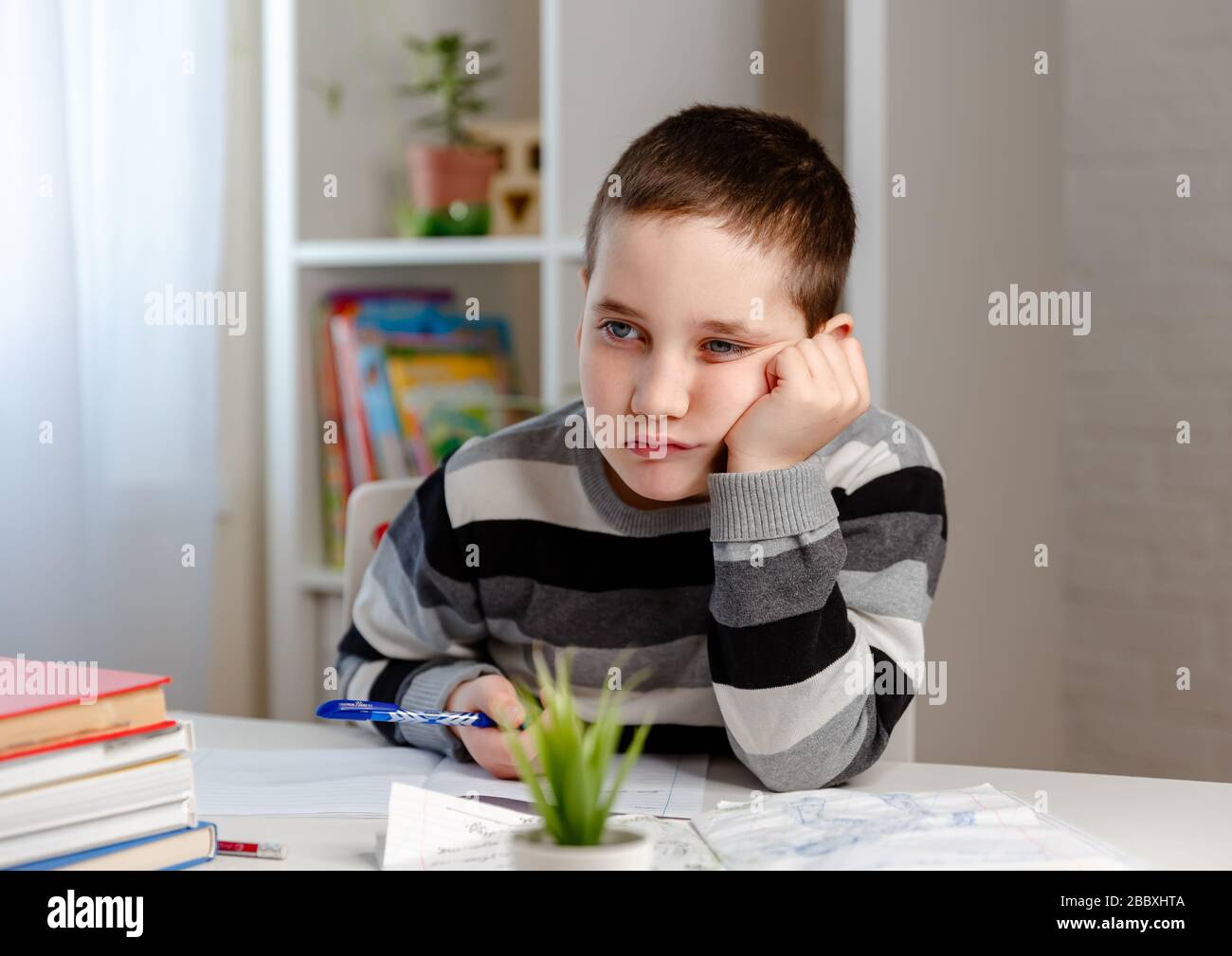 Online education distance learning. Schoolboy doing school homework ...