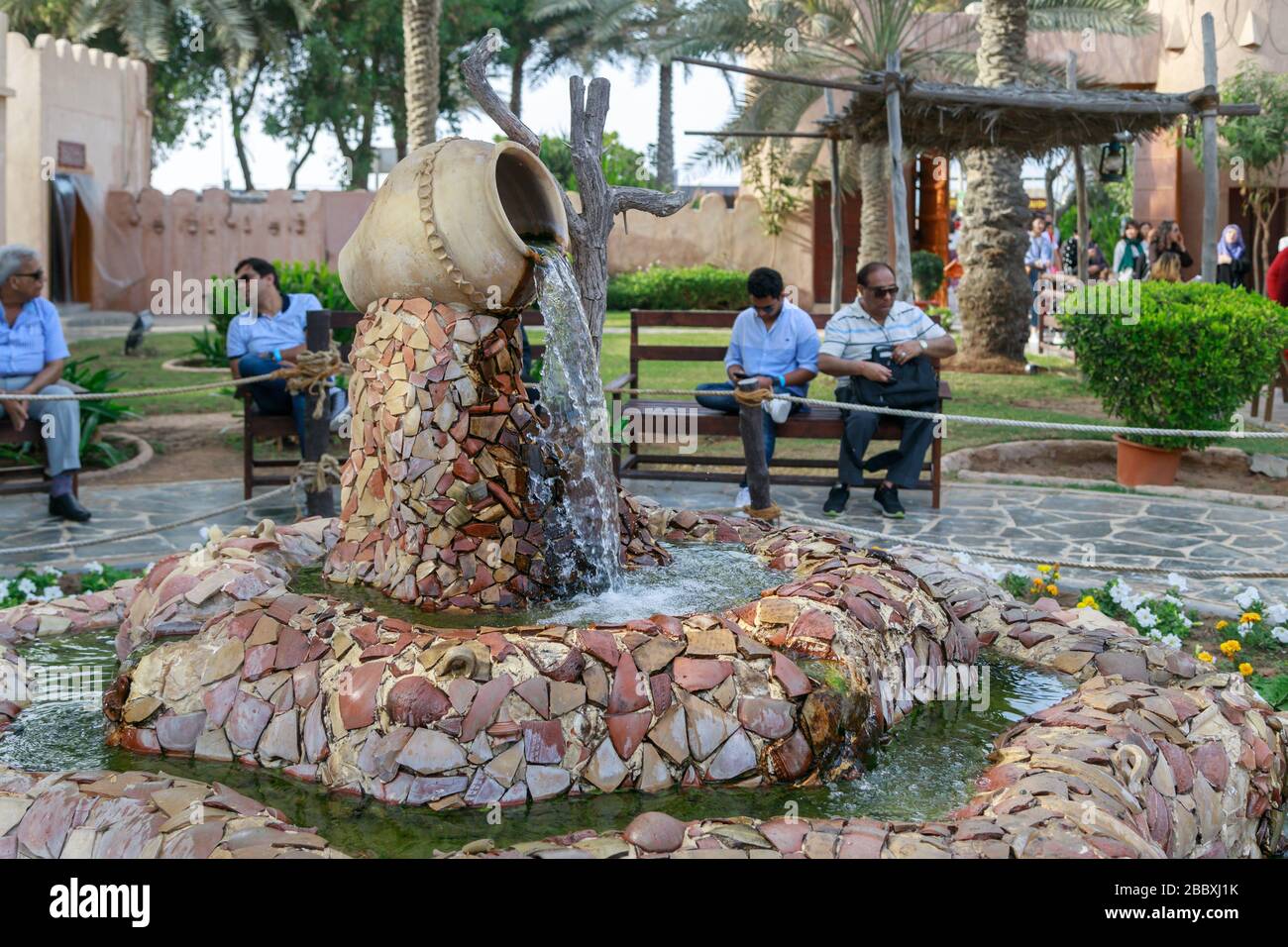 Abu Dhabi, UAE, January 10, 2019: Unusual fountain in shape of jug in ...