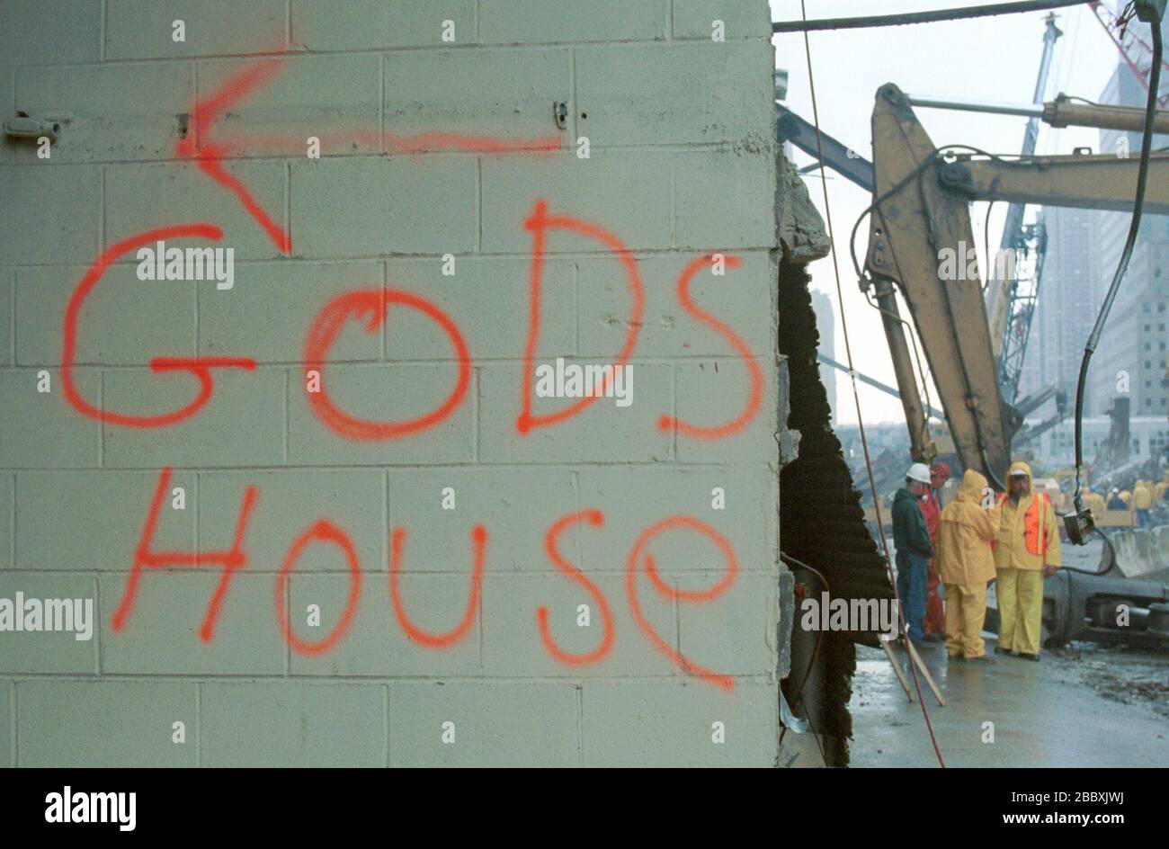 Construction workers painted "Gods House" on the exterior wall of the U ...