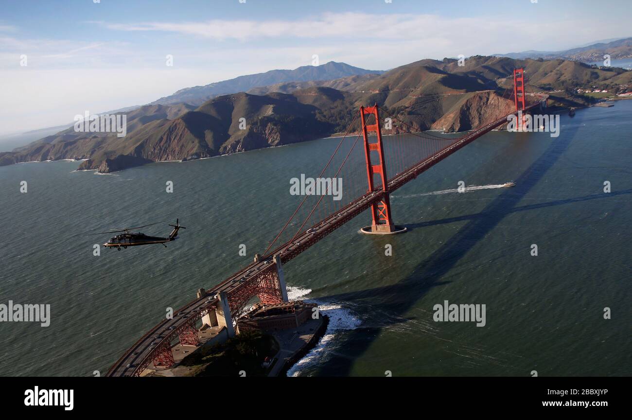A U.S. Customs and Border Protection Black Hawk helicopter flies over ...