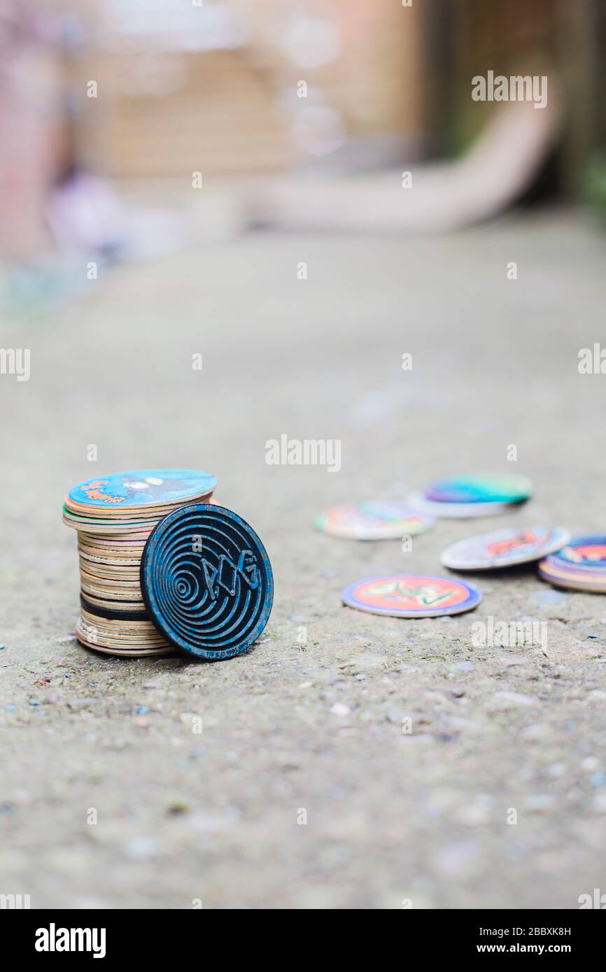 Popular 1990's playground game Pogs Stock Photo - Alamy