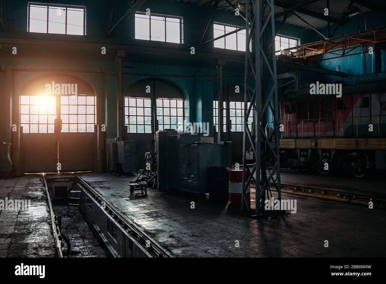 Old abandoned railroad workshop. Train repairing factory with old ...