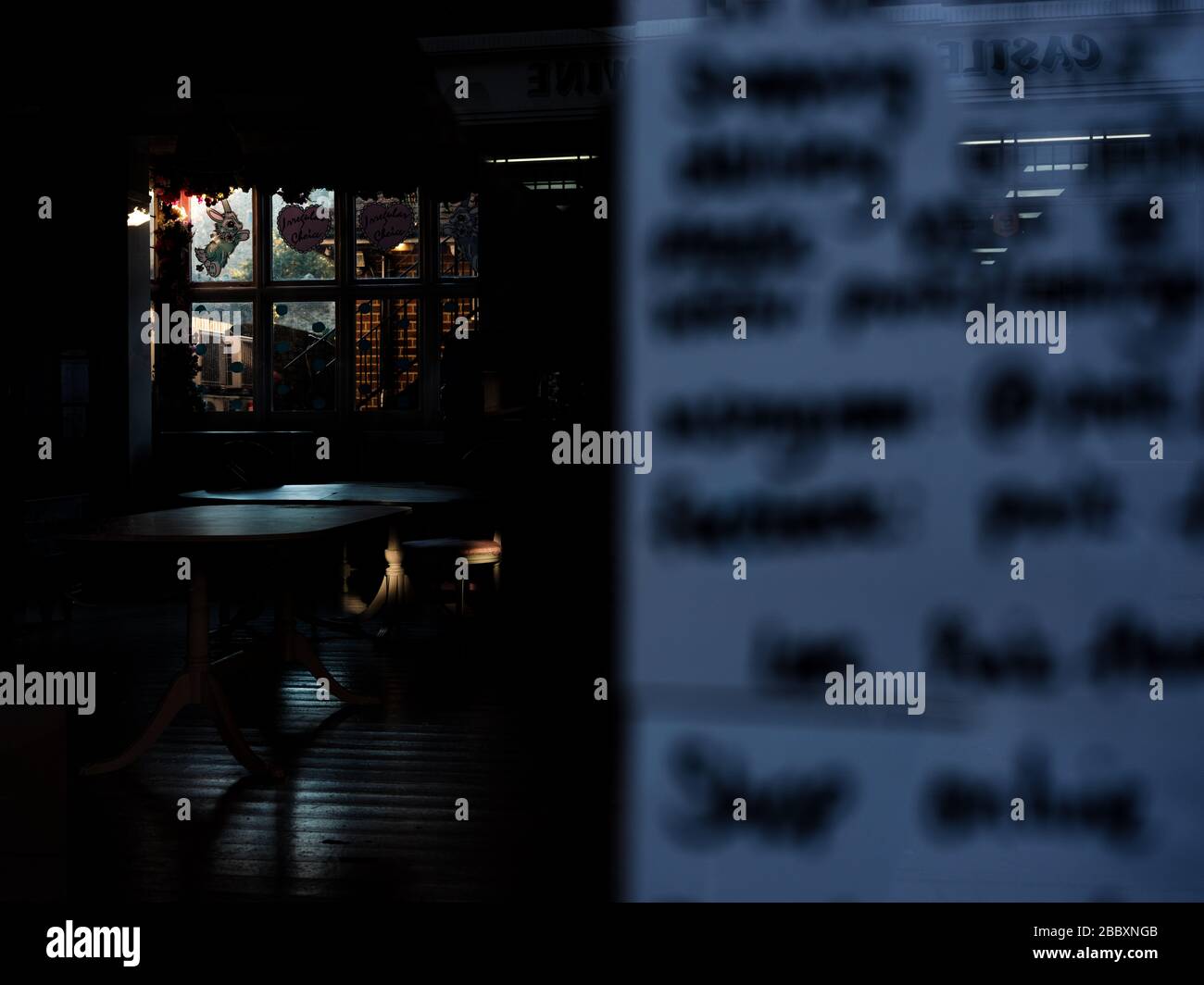 Sunlight comes through the back windows of a temporary closed retail ...