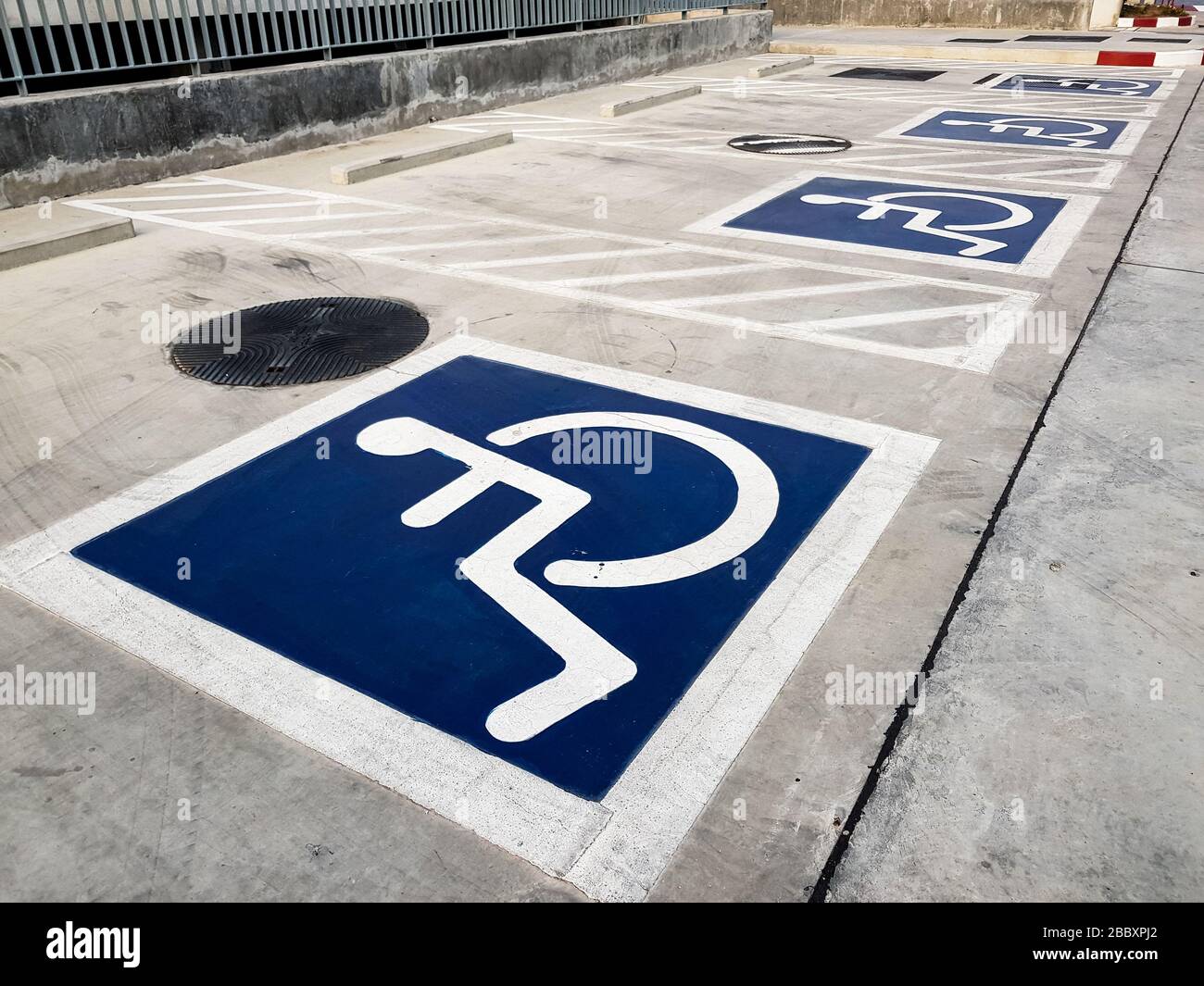 Disabled car parking bay painted hi-res stock photography and images ...