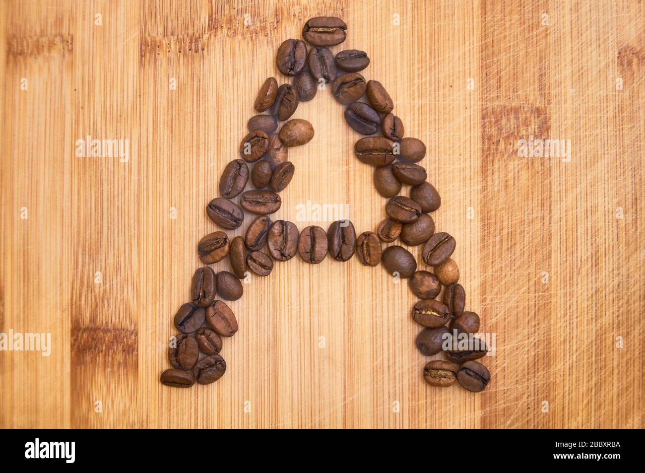 Alphabet letter A made from roasted coffee beans, 3D rendering on ...