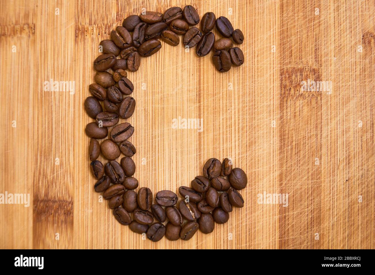 Alphabet letter C made from roasted coffee beans, 3D rendering on ...