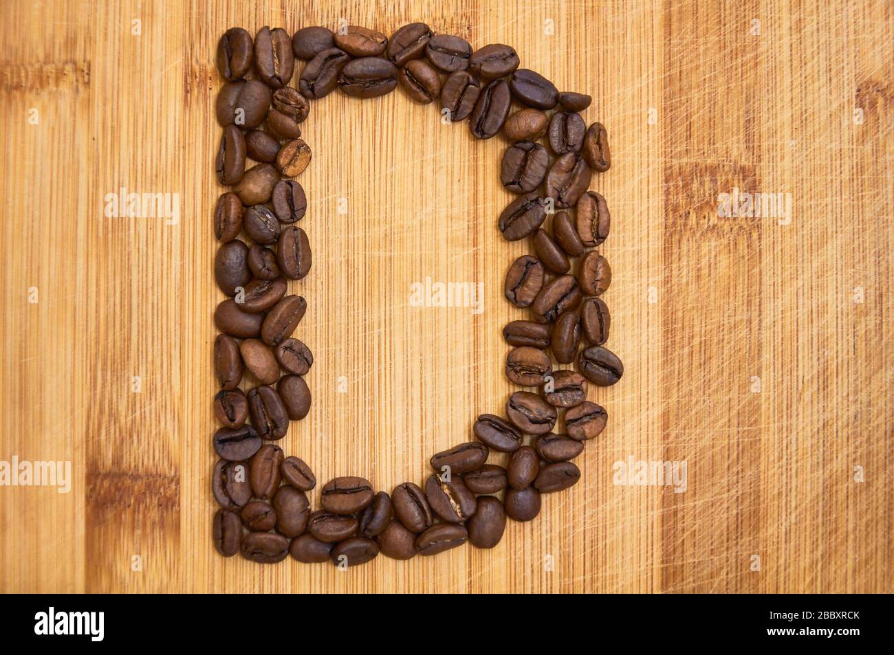 Alphabet letter D made from roasted coffee beans, 3D rendering on ...