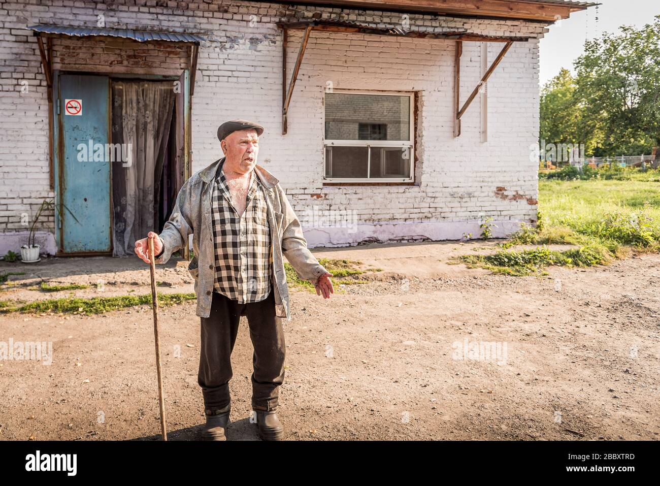 Siberia, Russia - August 13, 2019. Elderly senior Russian man speaking ...