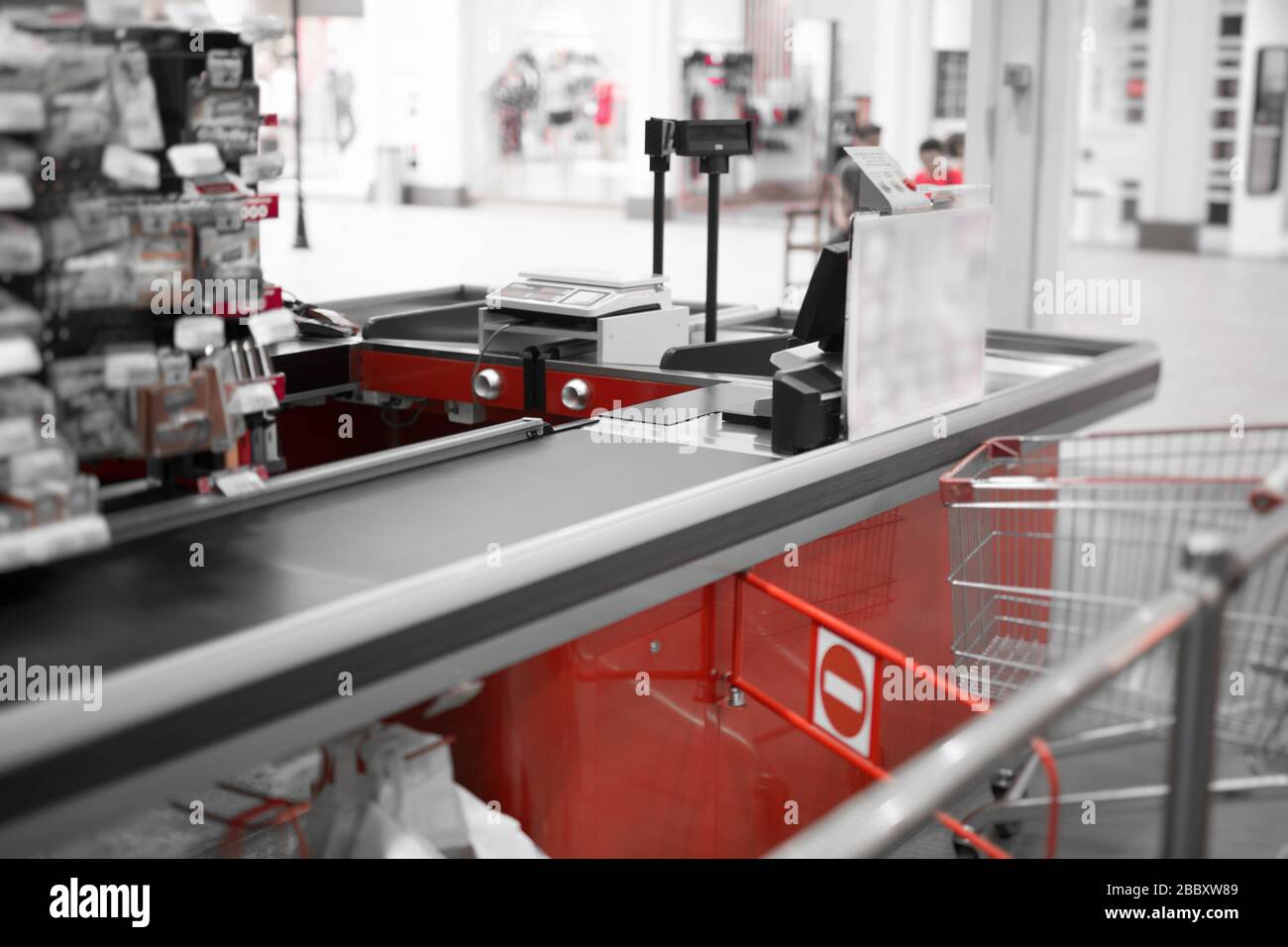 Empty cash desk with closed way border in supermarket Stock Photo - Alamy