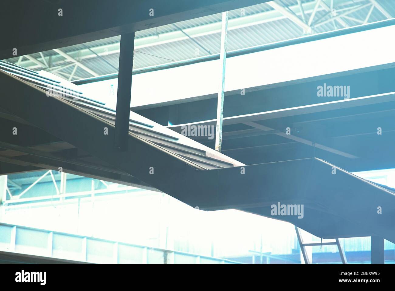 Steel stairway on a metal construction background, Steel stairs at the ...
