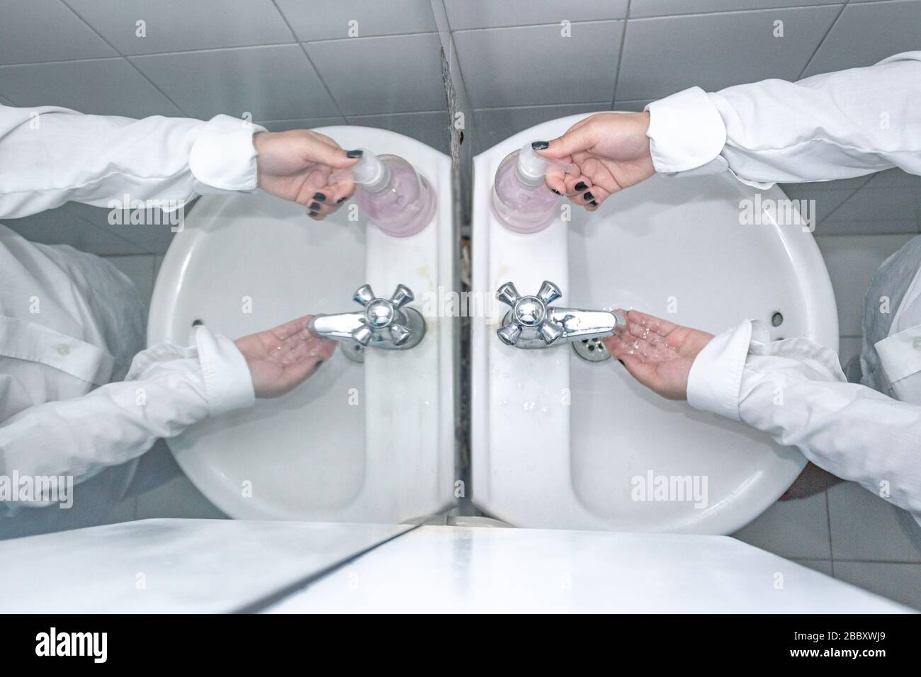 double washing of woman's hands in a bathroom taken from above 8 Stock ...