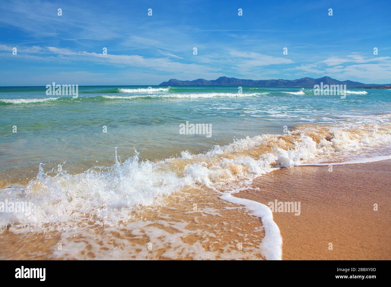 perfect sand beach with sea waves Stock Photo - Alamy