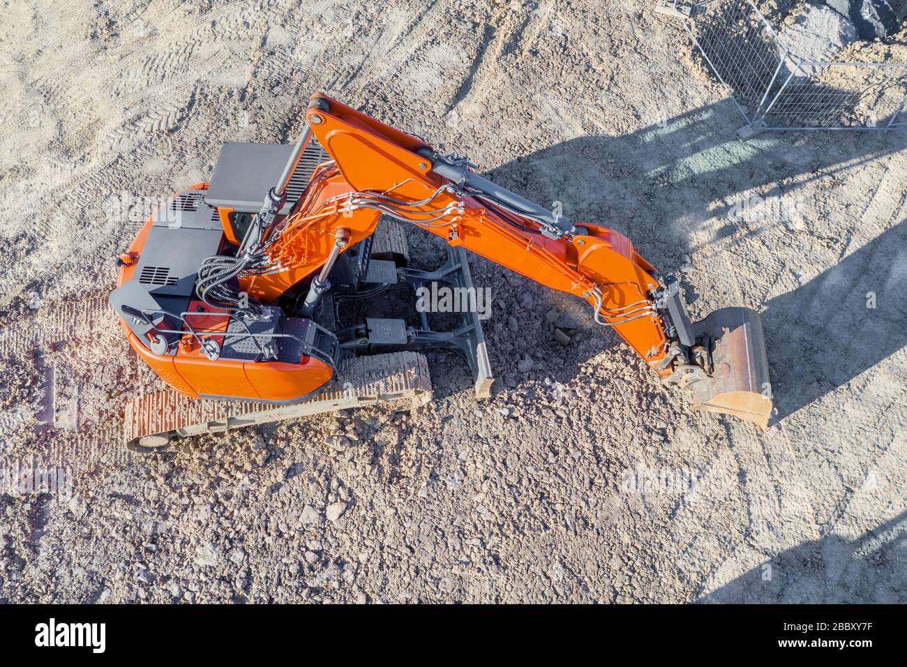 excavator on an construction site from above Stock Photo - Alamy