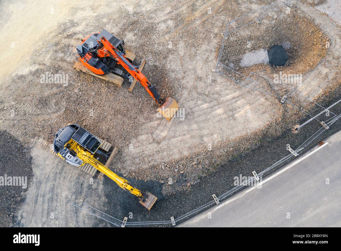 two excavator on an construction site from above Stock Photo - Alamy