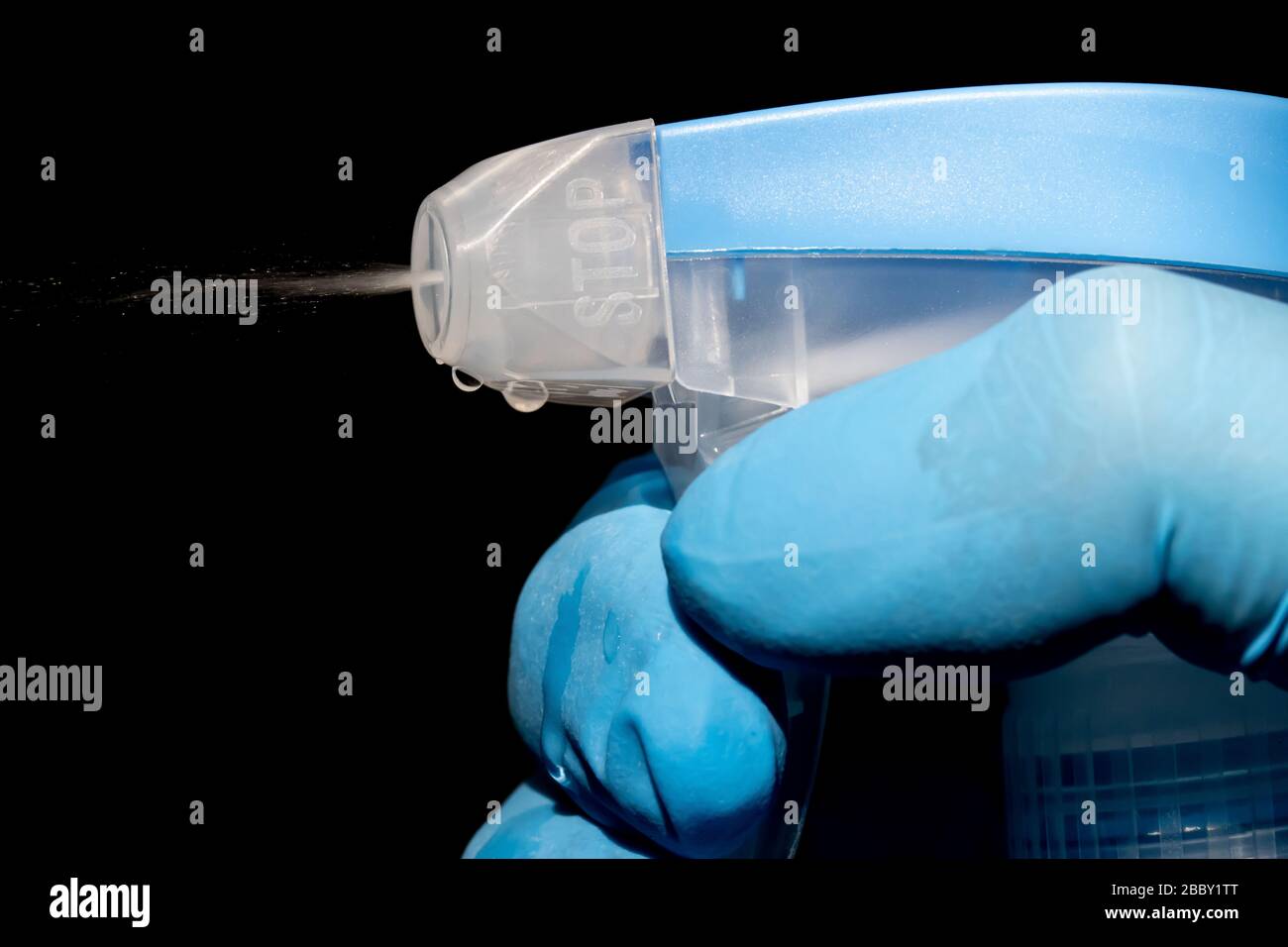 The detailed look of bottle spray when squirt solution, macro view ...