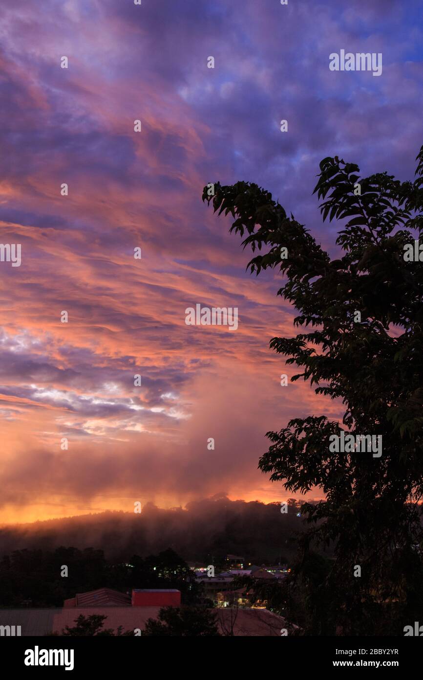 Colorful clouds at sunset over Santa Elena town, gateway to the cloud ...