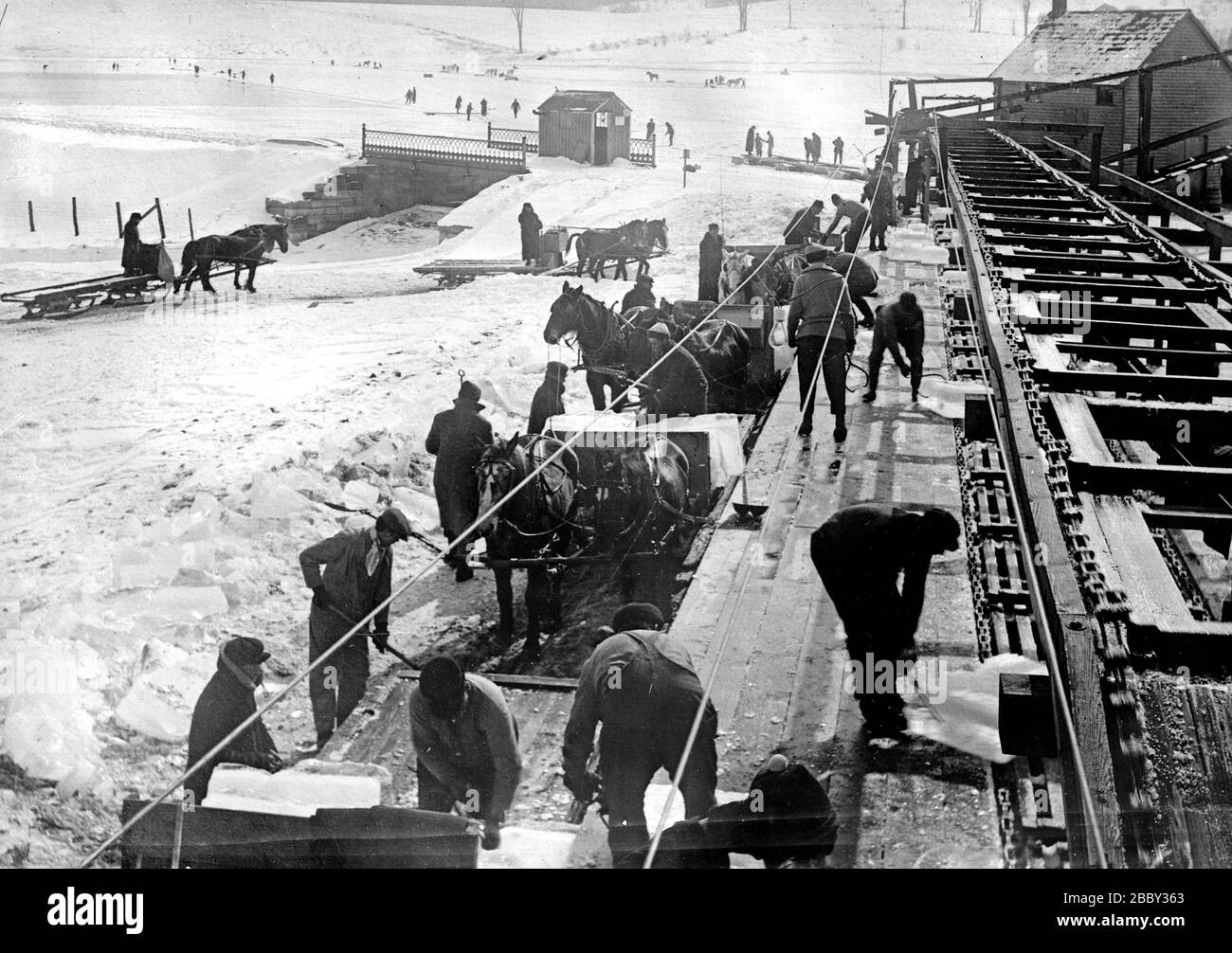 Sawing ice from frozen lake hi-res stock photography and images - Alamy