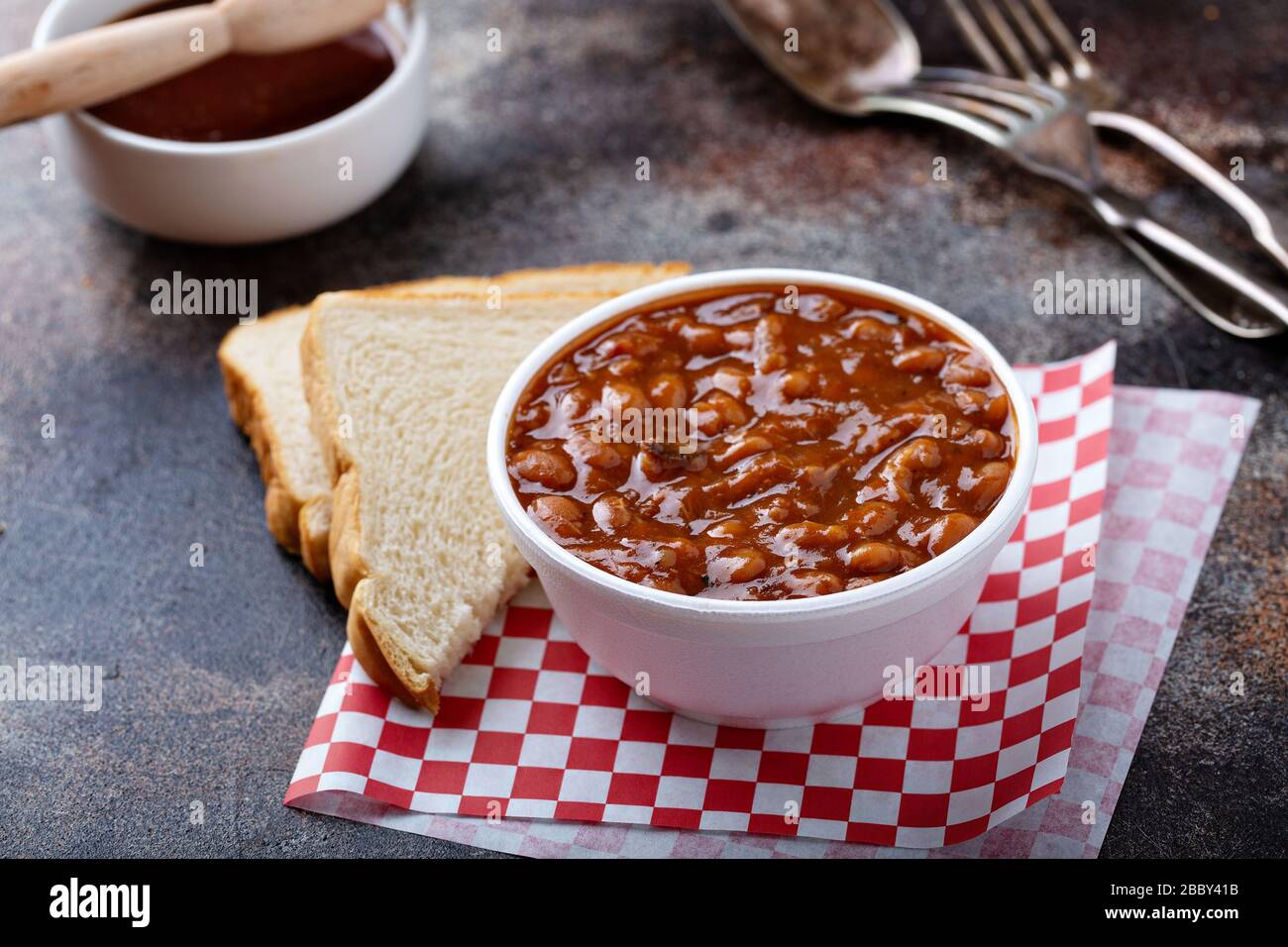 Baked beans in a foam bowl Stock Photo - Alamy