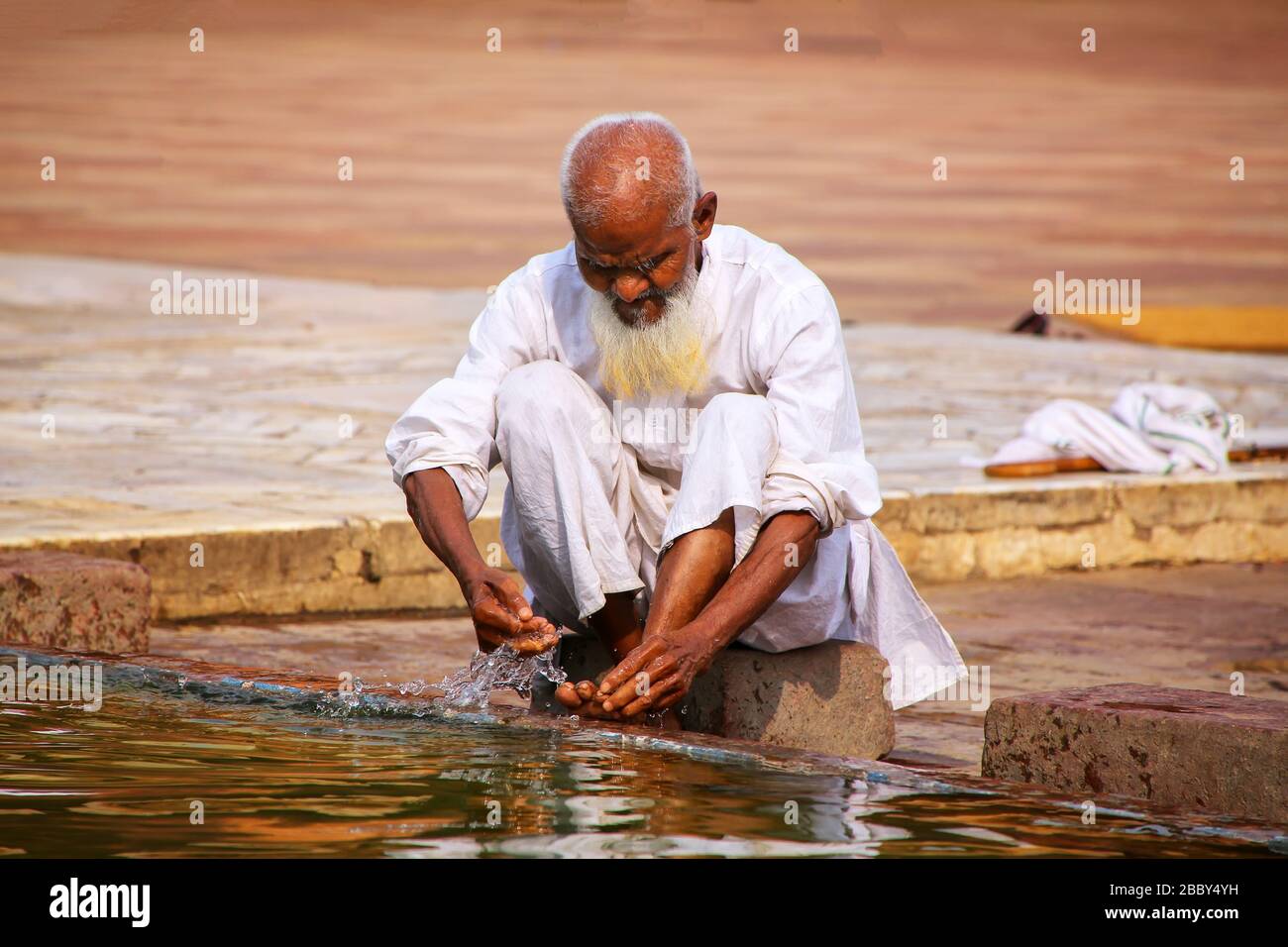 Man washing his feet hi-res stock photography and images - Alamy