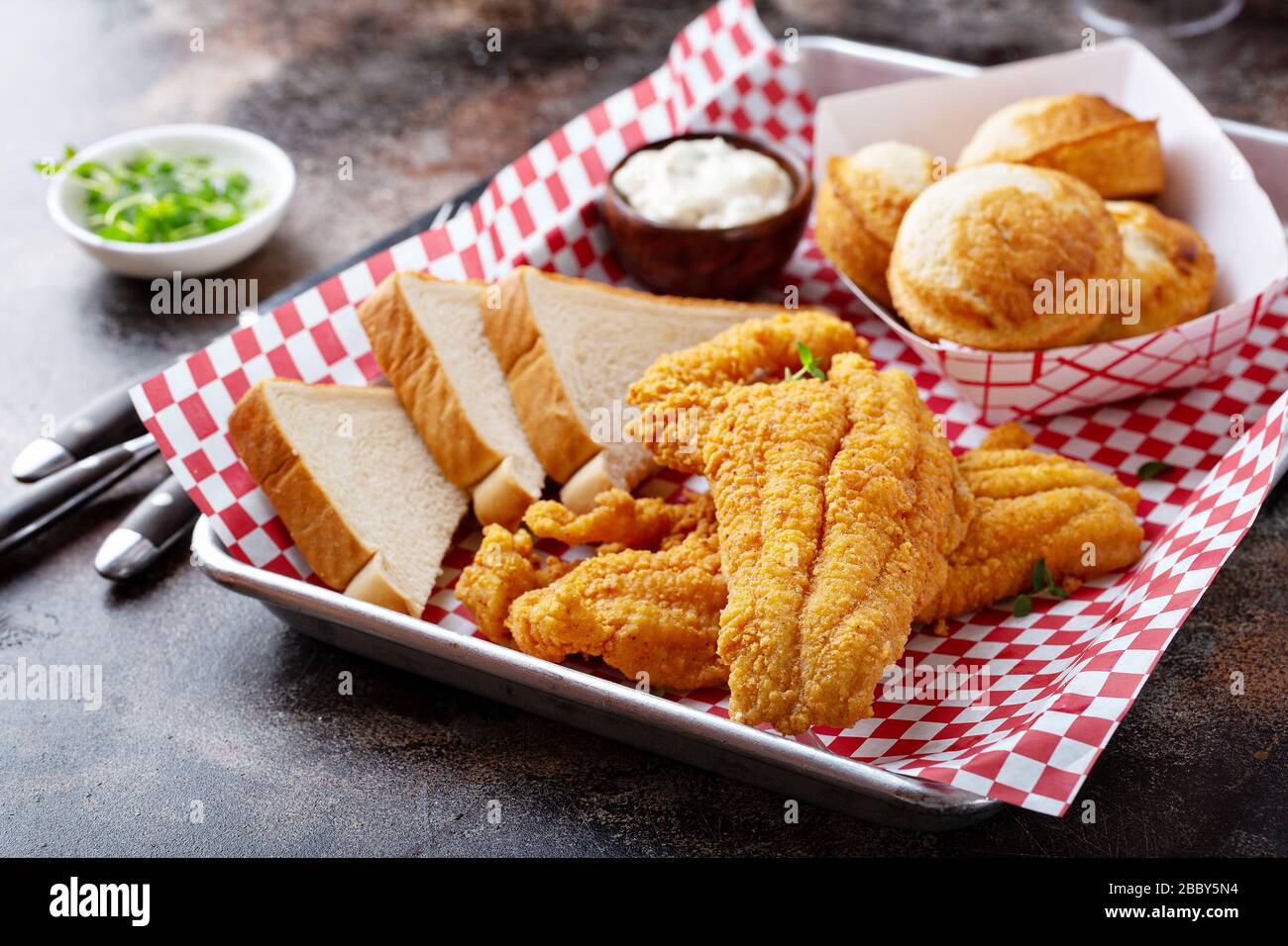 Fried catfish with cornbread Stock Photo - Alamy
