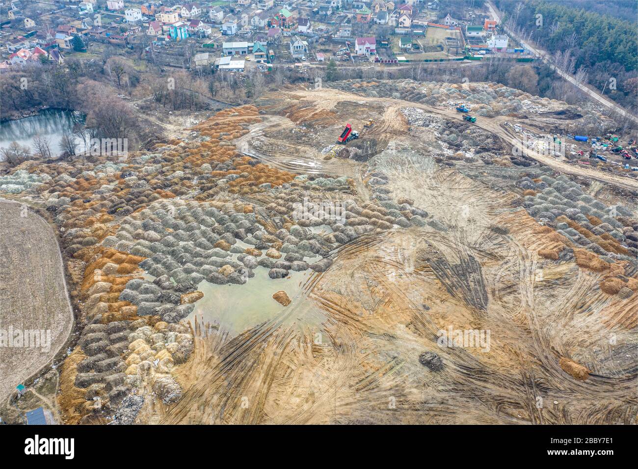 Construction site near the village and the forest, the impact of human ...