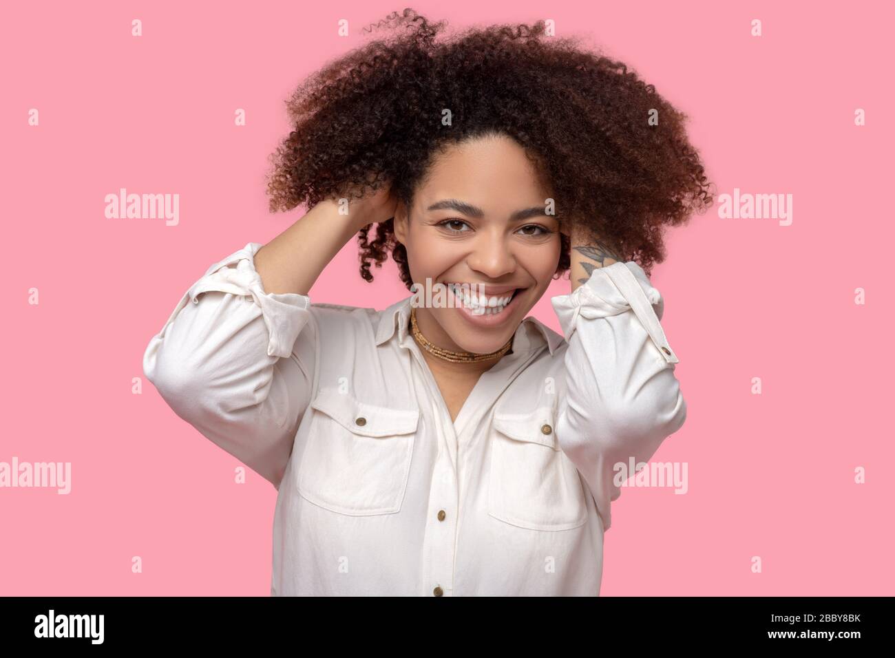 Hands touching hair hi-res stock photography and images - Alamy