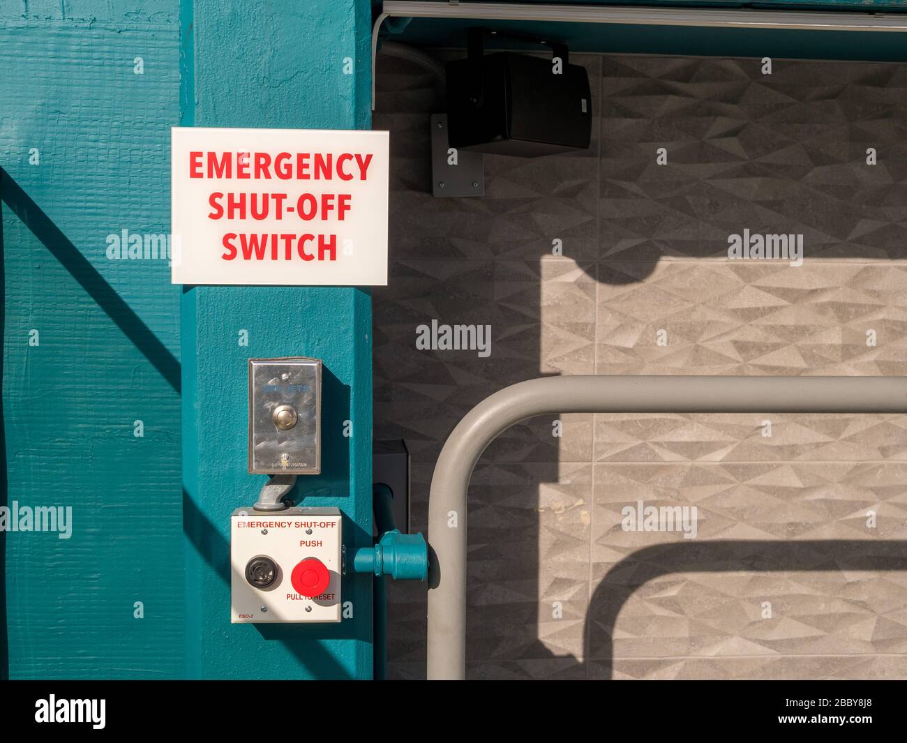 Emergency shut-off switch sign and button outside of pool Stock Photo ...