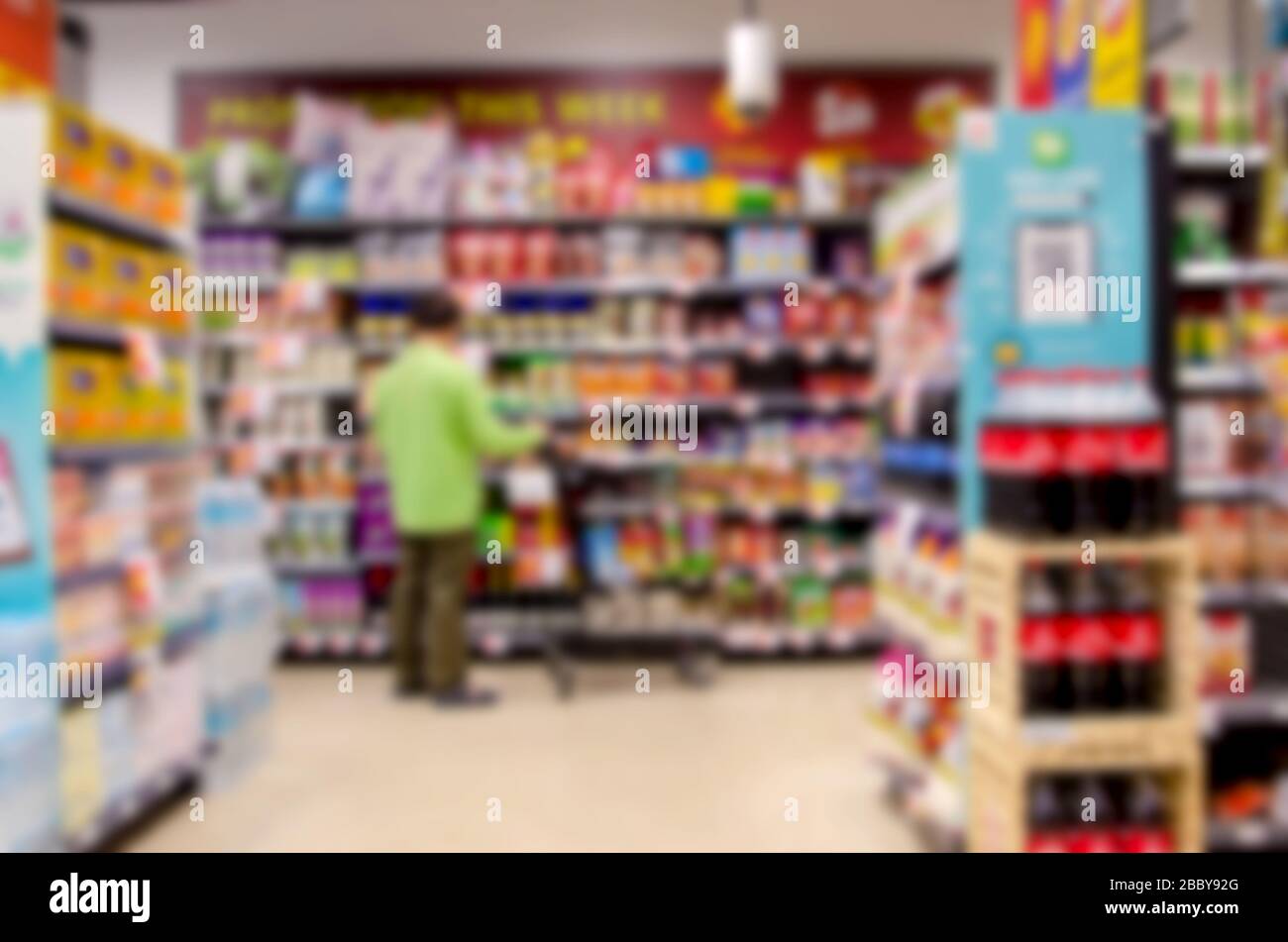 Supermarket blur the shelves for goods and food background Stock Photo ...