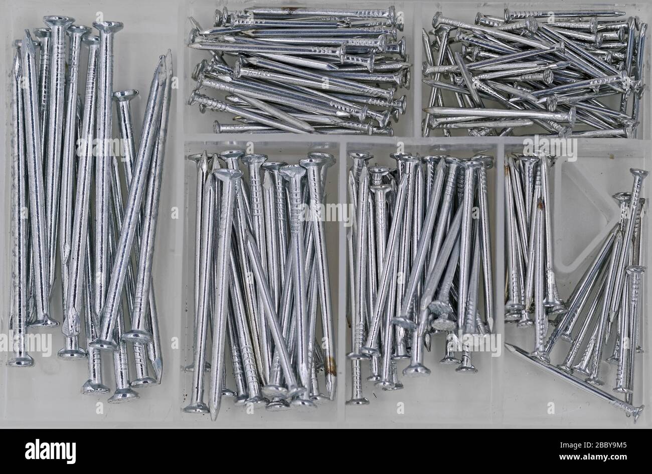 top view of a sortiment of galvanized nails Stock Photo - Alamy
