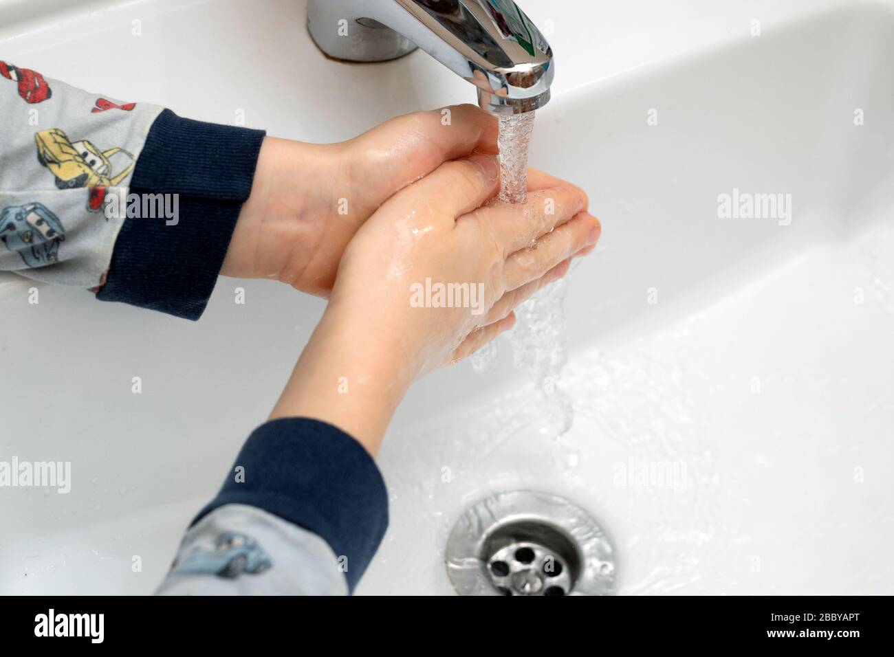 Washing hands. Hygiene and cleanliness. Bathroom background Stock Photo ...