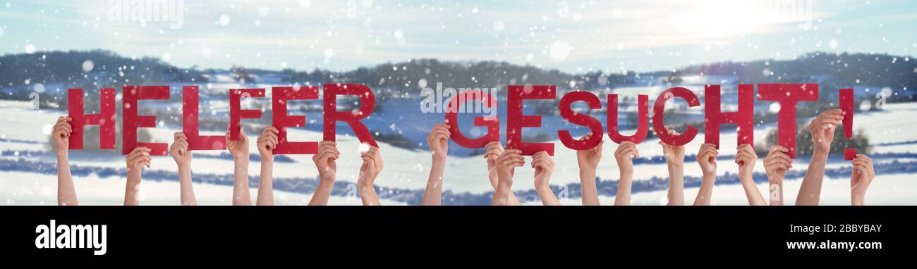 People Hands Holding Word Helfer Gesucht Means Help Wanted, Winter ...