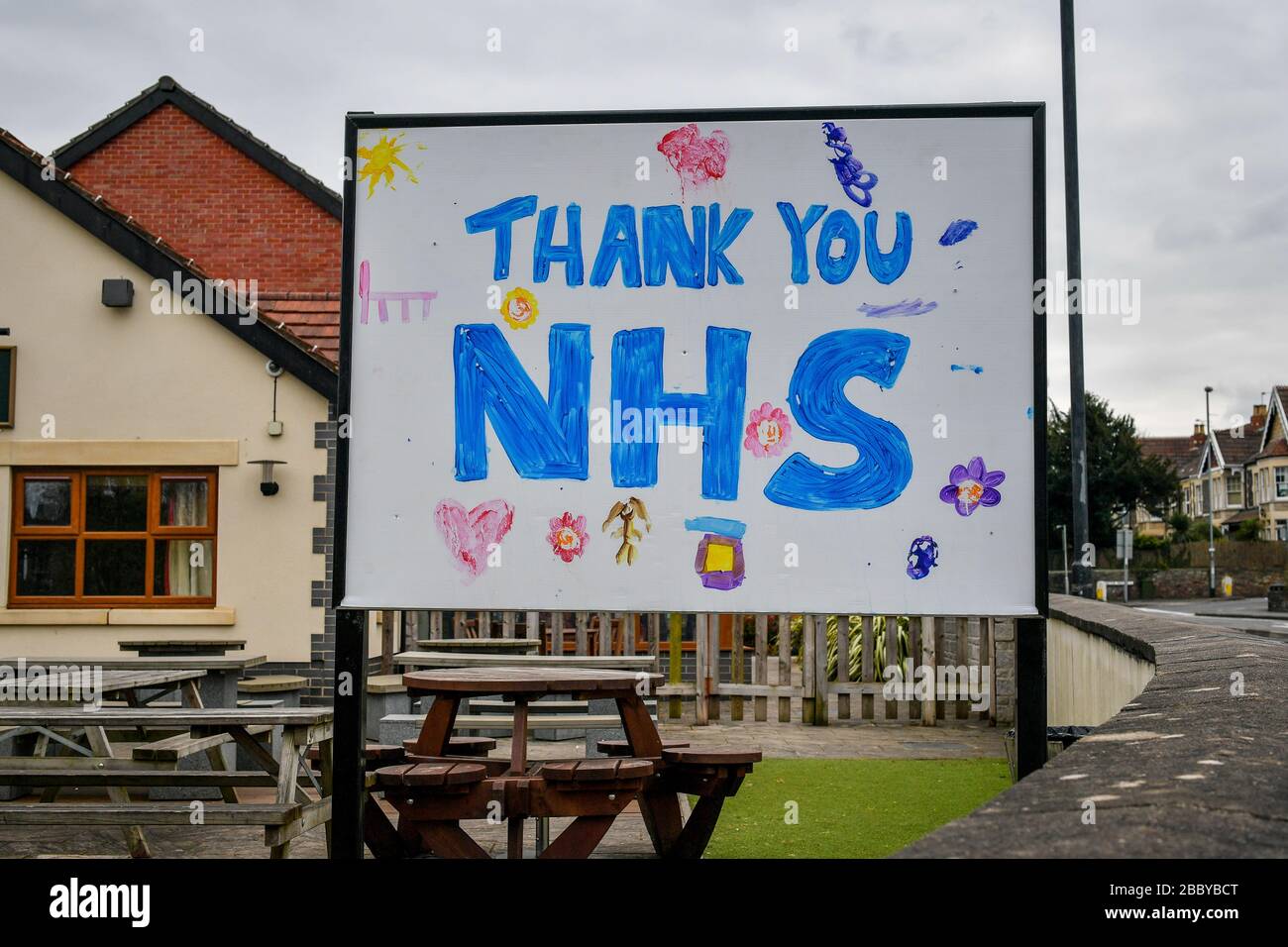 A thank you message to the NHS is painted on a closed pub in Bristol as ...