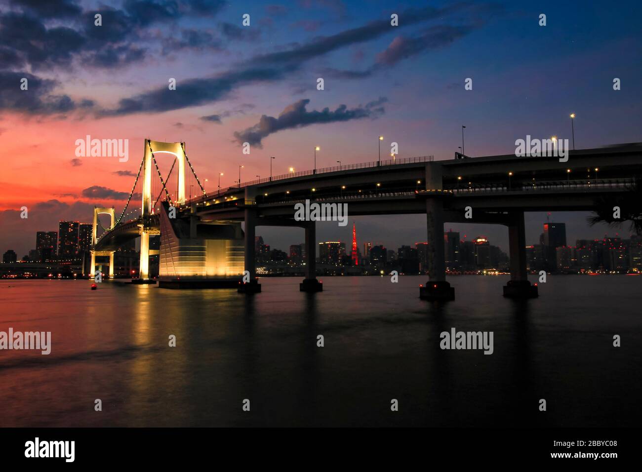 Rainbow bridge in the dusk Stock Photo - Alamy
