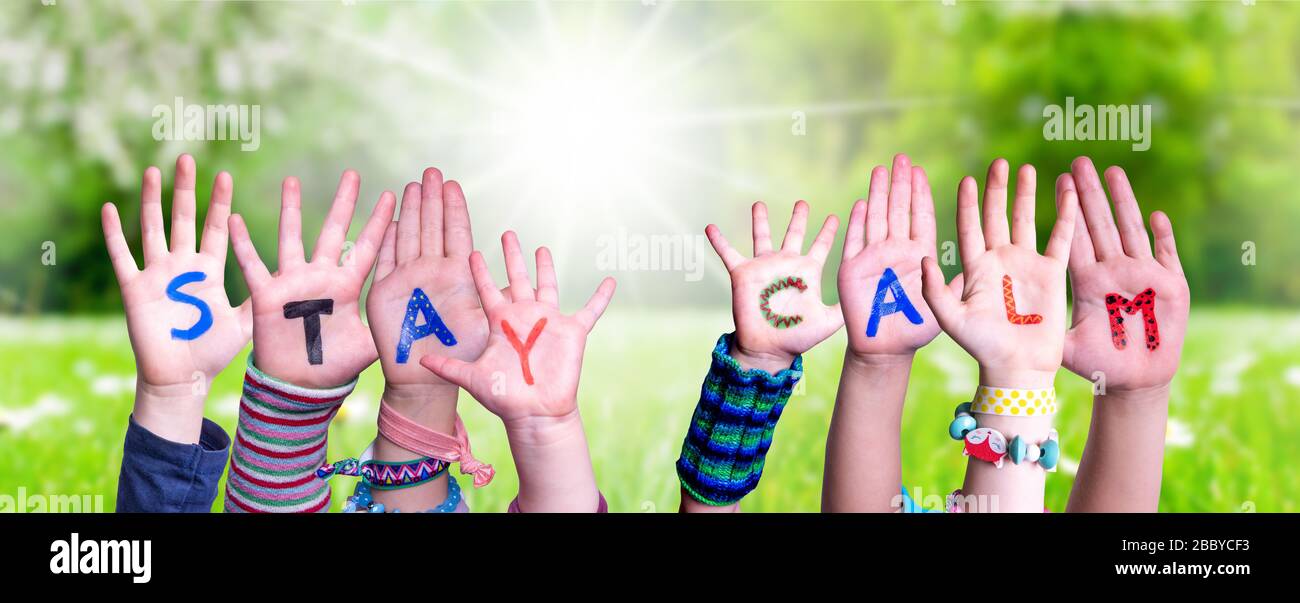 Children Hands Building Word Stay Calm, Grass Meadow Stock Photo - Alamy