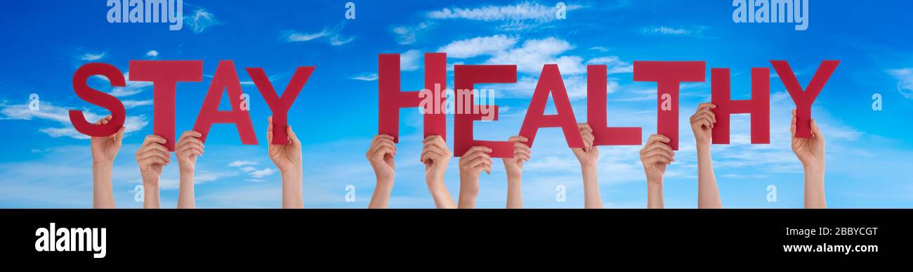 People Hands Holding Word Stay Healthy, Blue Sky Stock Photo - Alamy
