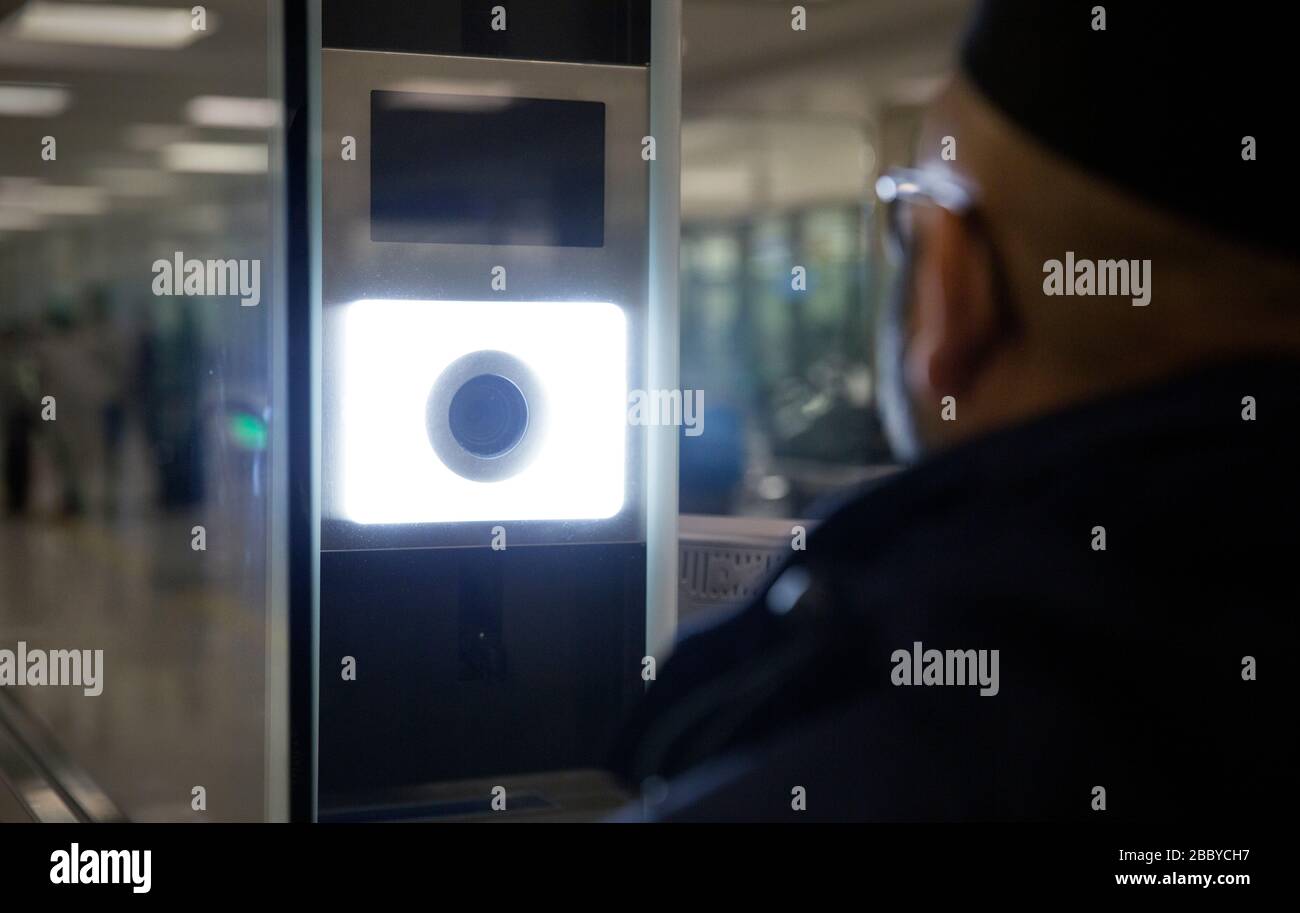 U.S. Customs and Border Protection officers screen international ...