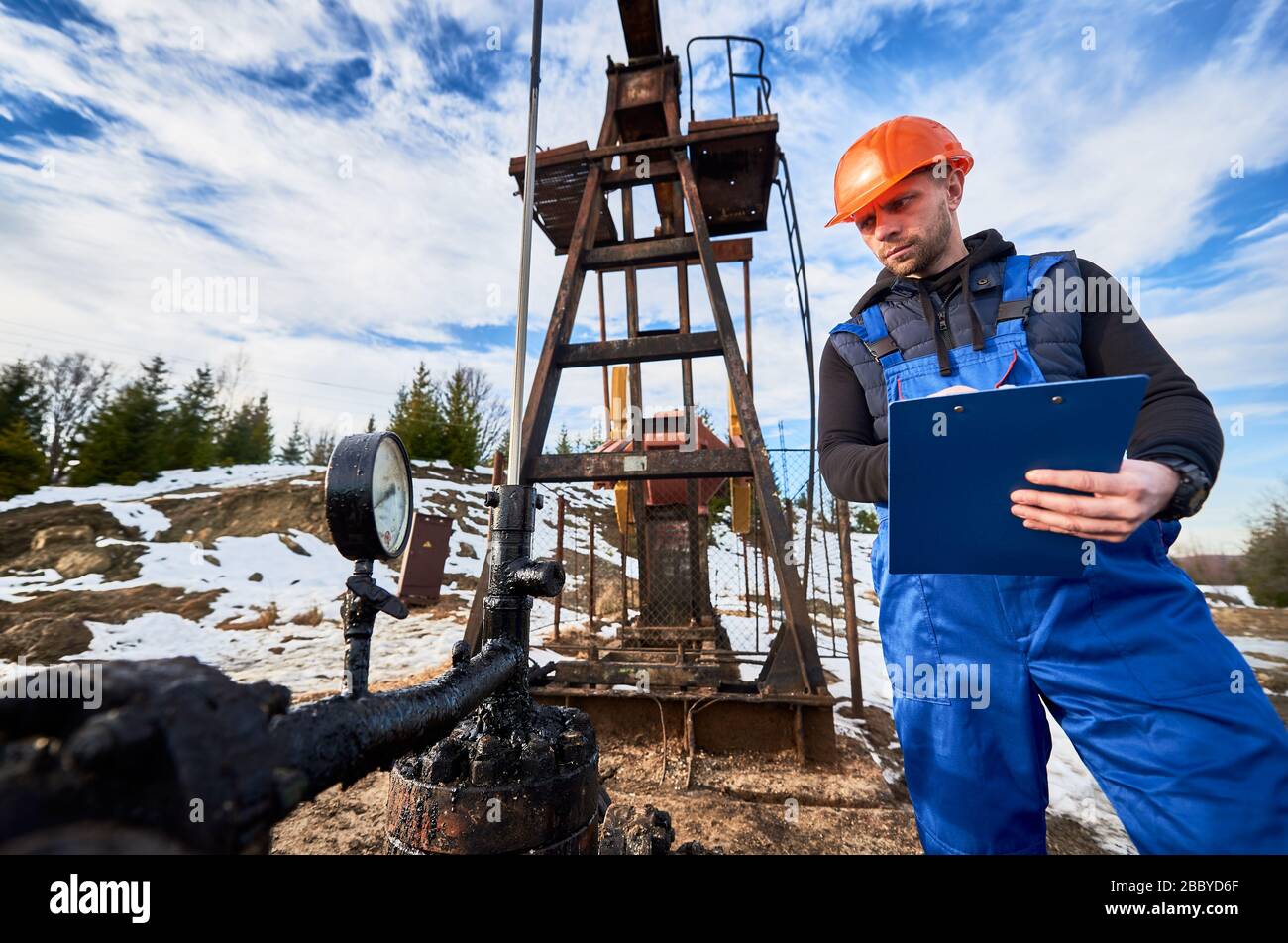Construction worker helmet male serious hi-res stock photography and ...