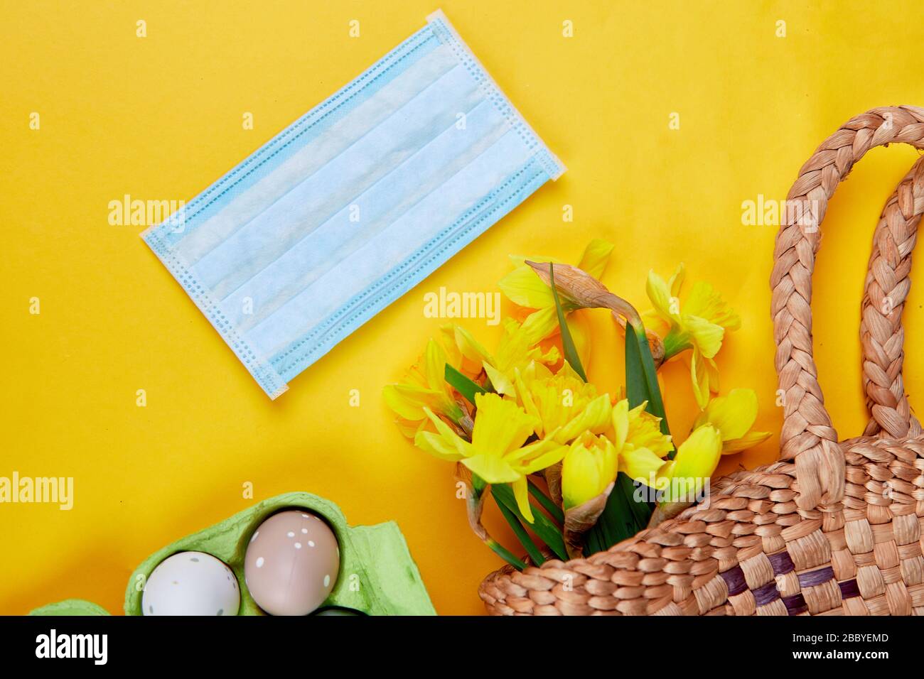 Flat lay of easter composition at coronavirus quarantine. Easter symbol ...