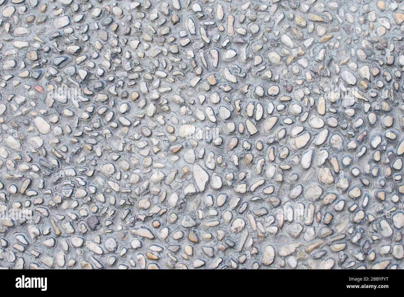 The surface of the many river stones. Great for design and texture ...