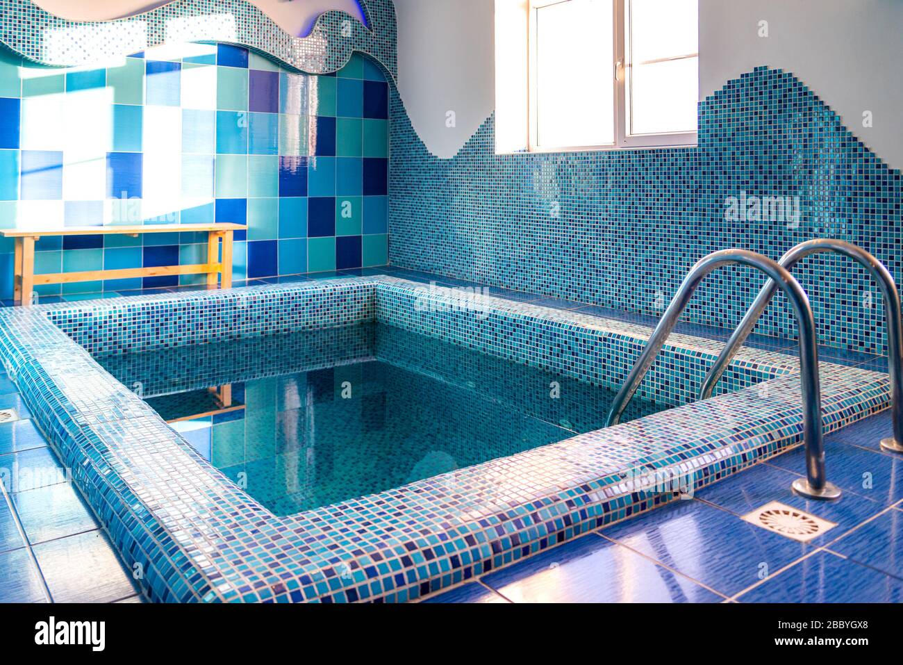 Small swimming pool with blue cold water at the bath complex Stock ...