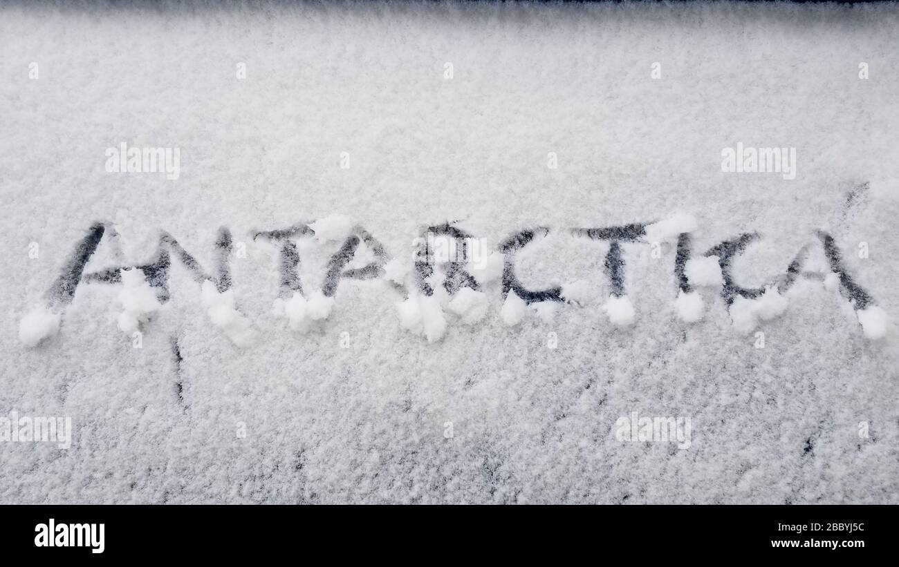 The word Antarctica written in snow Stock Photo - Alamy