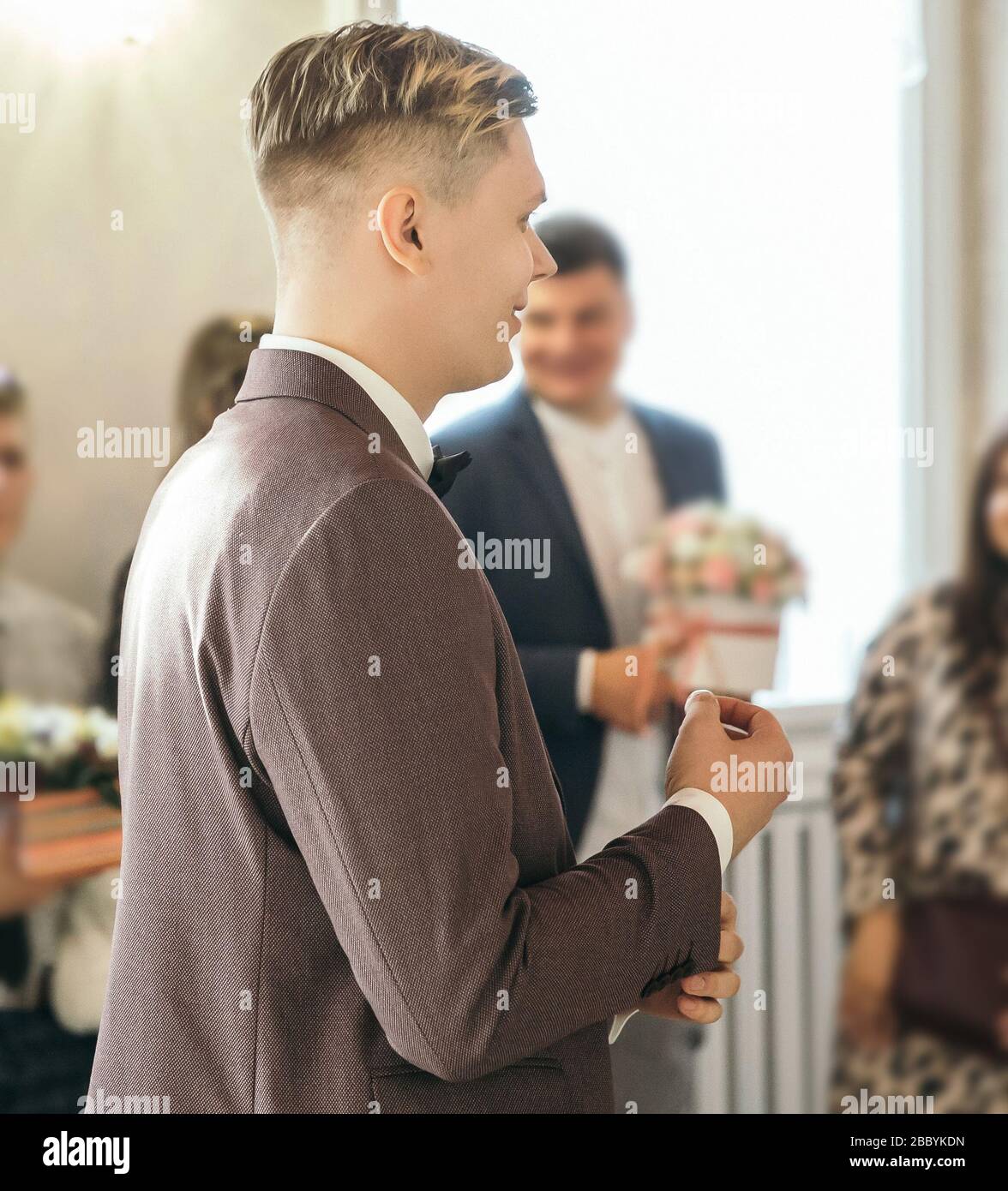 beautiful groom waiting for the wedding ceremony to begin Stock Photo ...