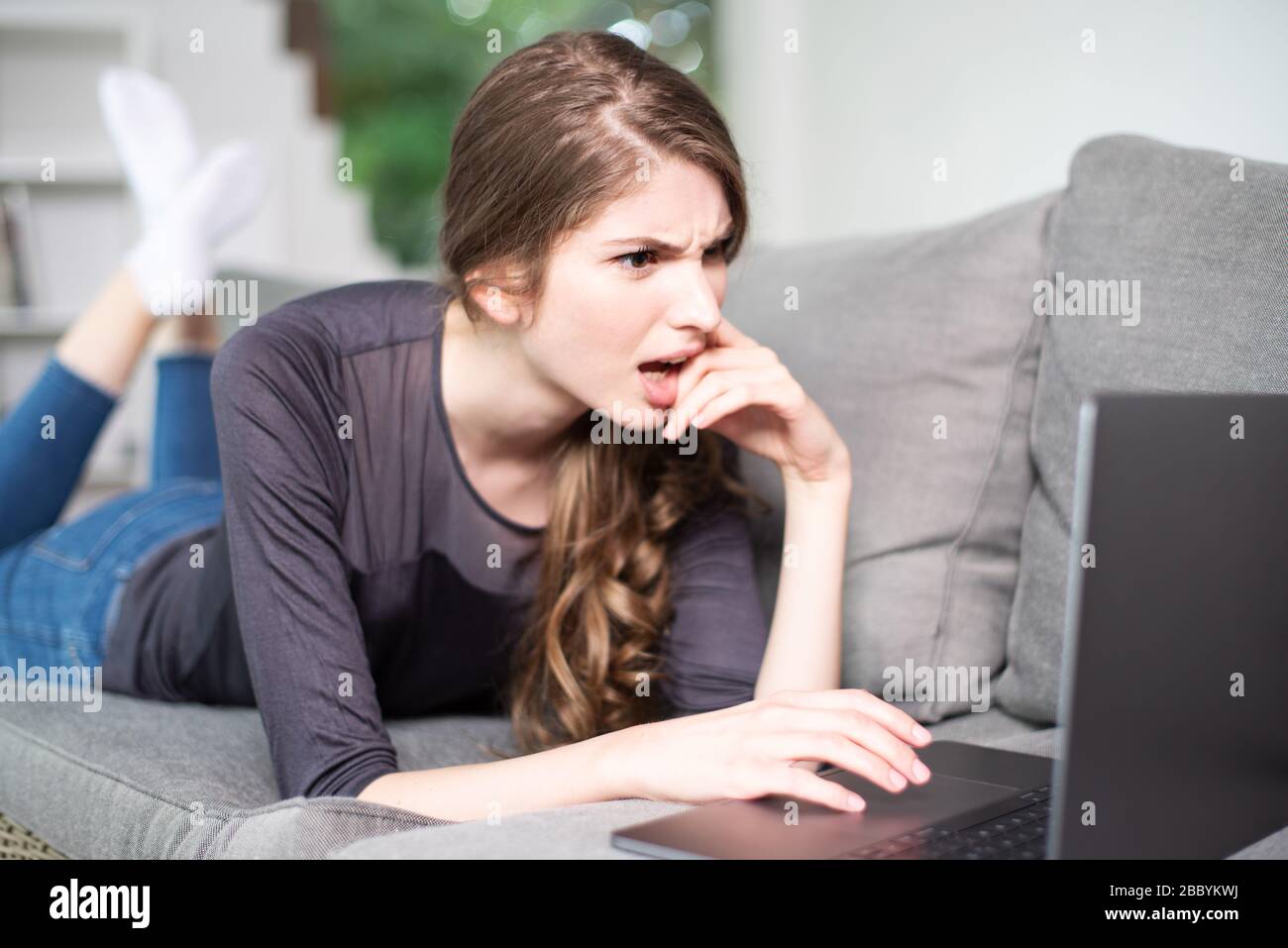 Frightened woman home hi-res stock photography and images - Alamy