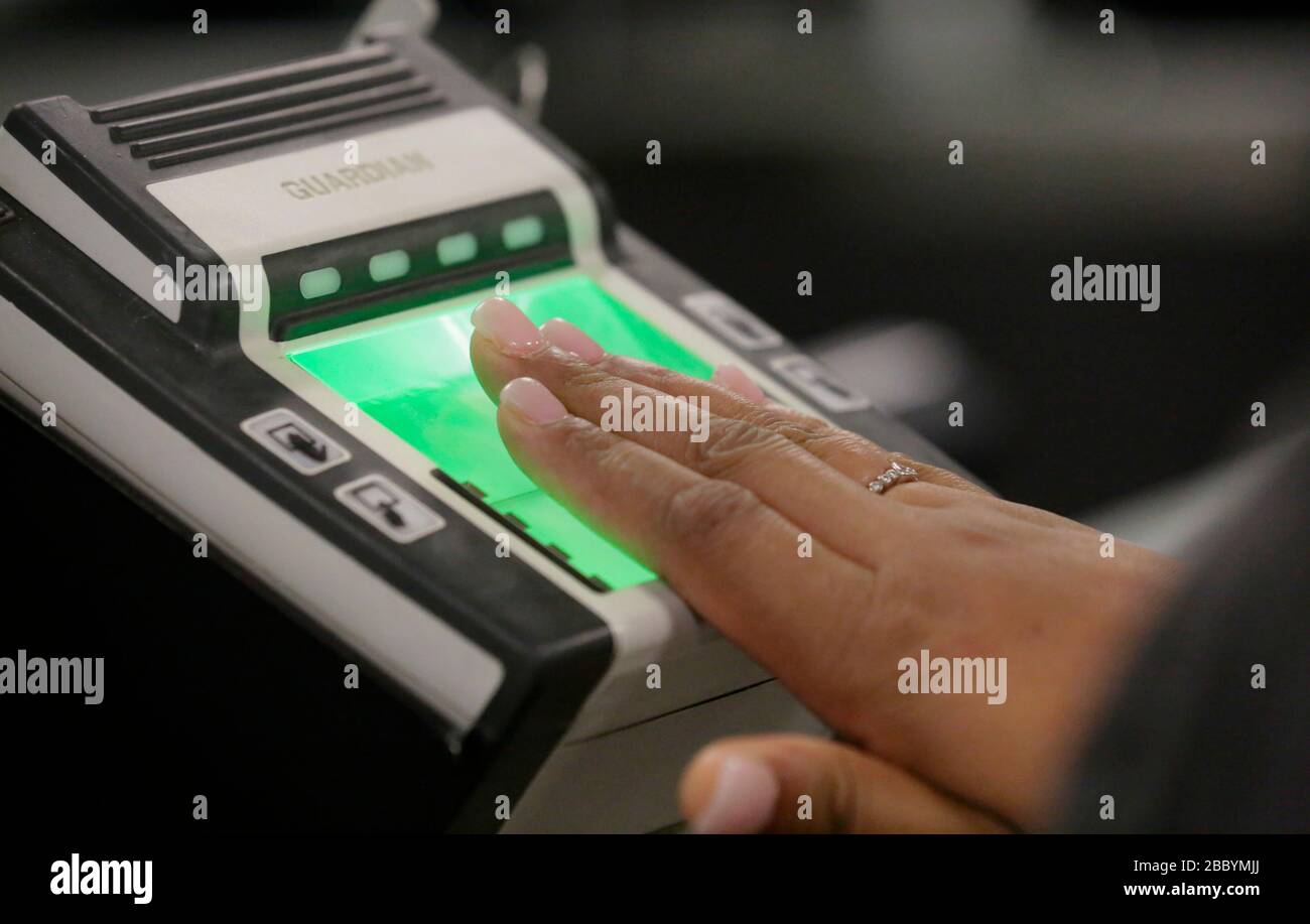 U.S. Customs and Border Protection officers screen international ...