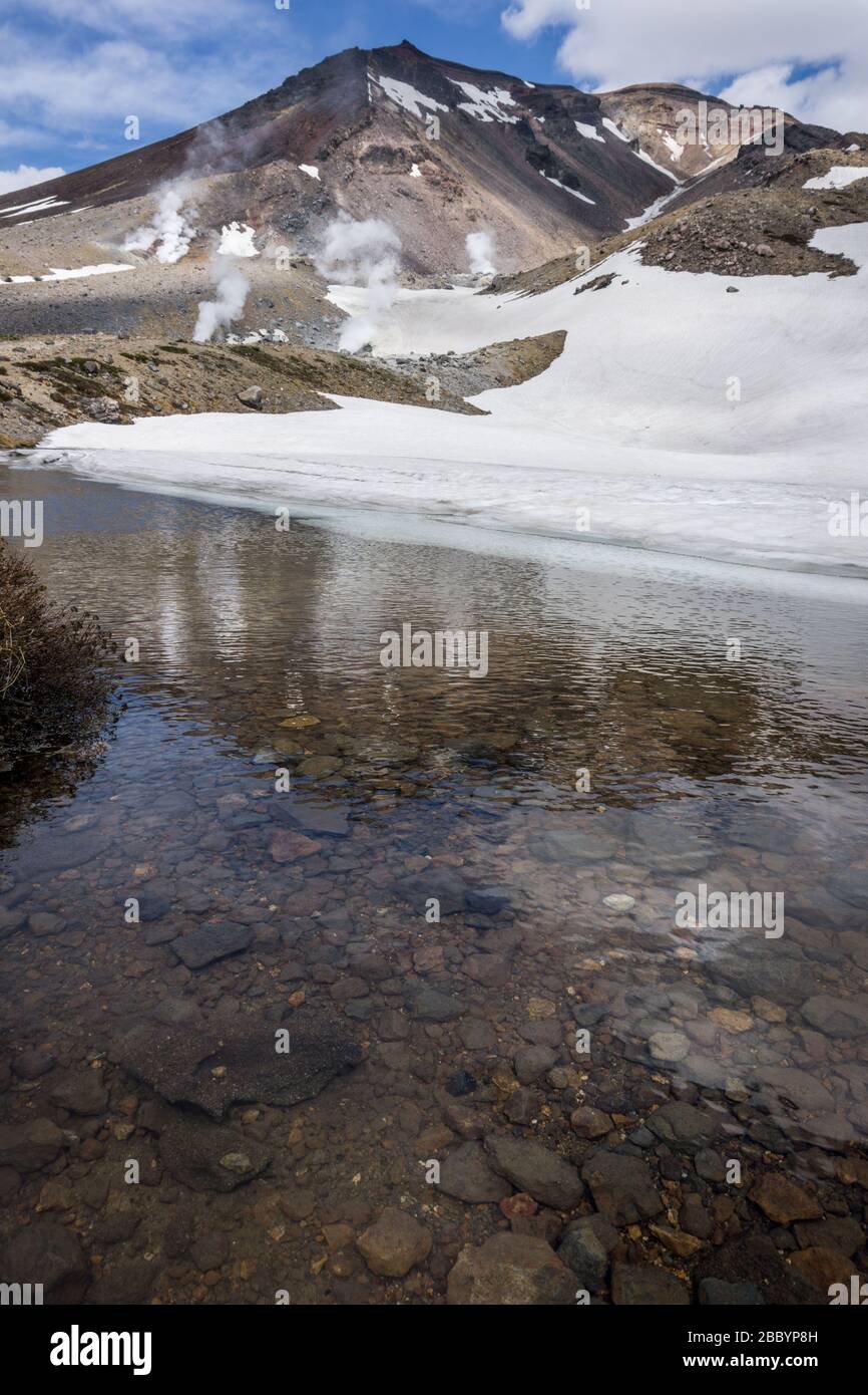 View of Asahidake (Mount Asahi) in Japan, taken in June. View shows the ...